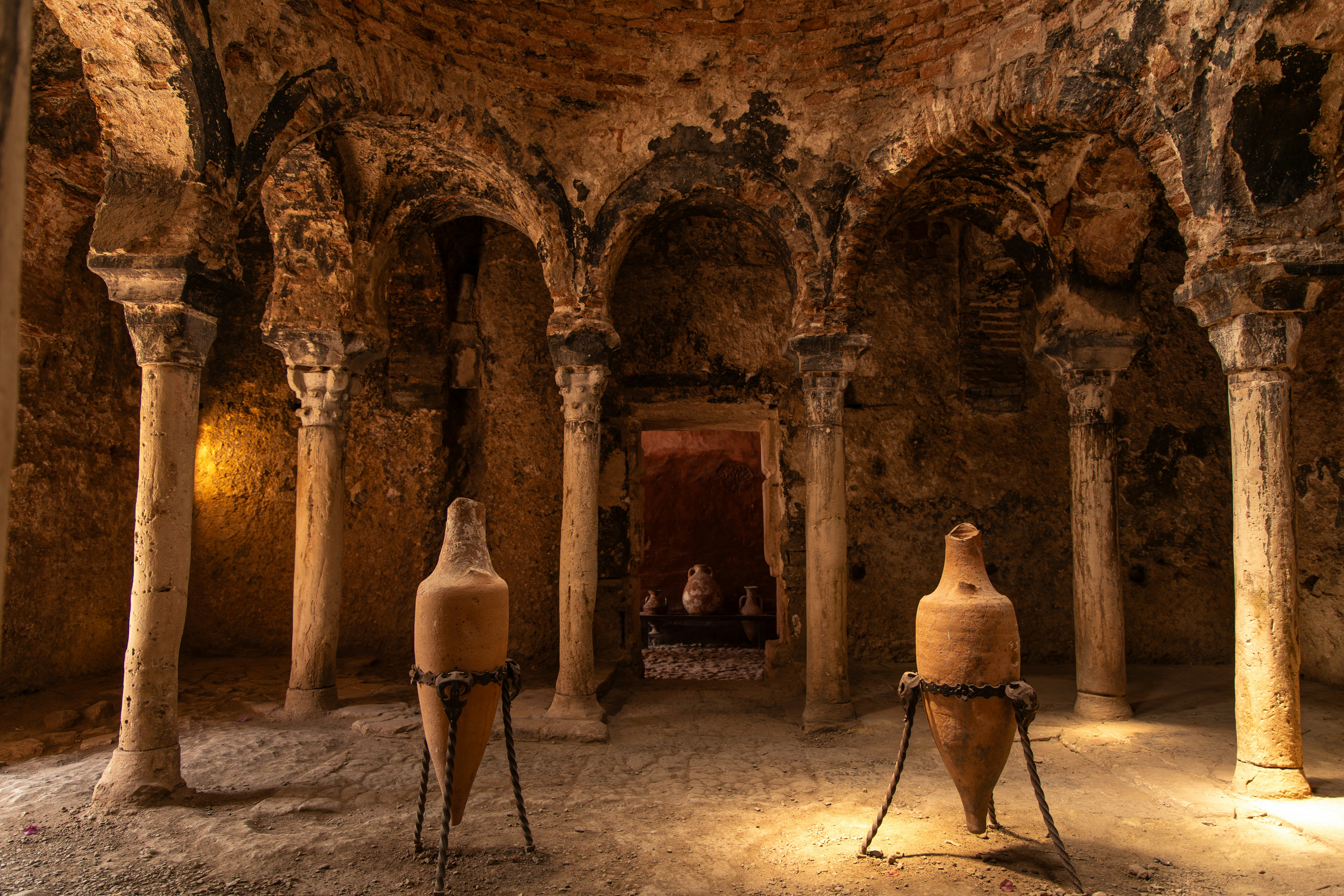 Echoes in the Sacred Vault: Clay Jars and Stone Arches