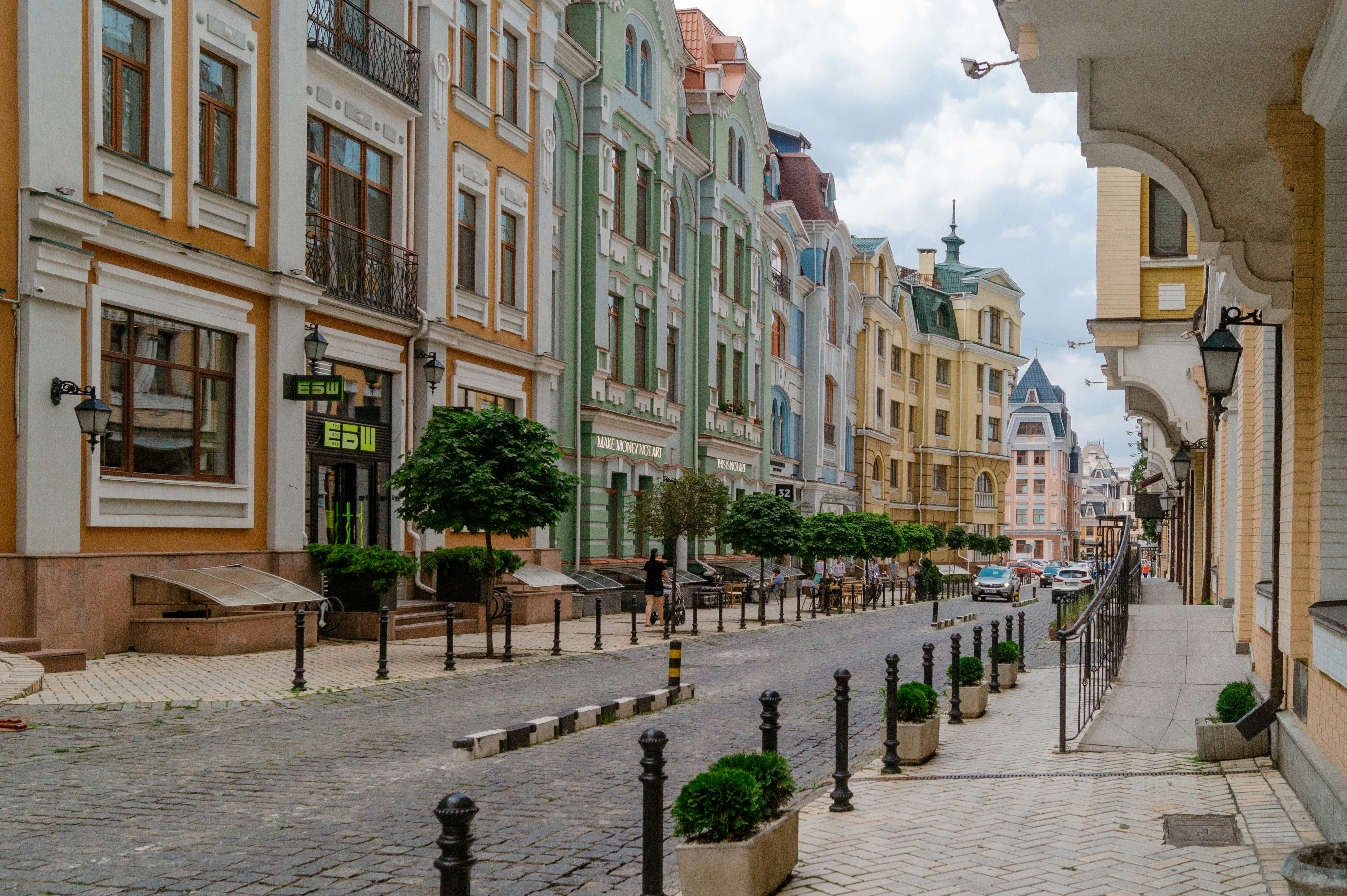 Colorful European Street Amid Cobblestones and Crescent Facades