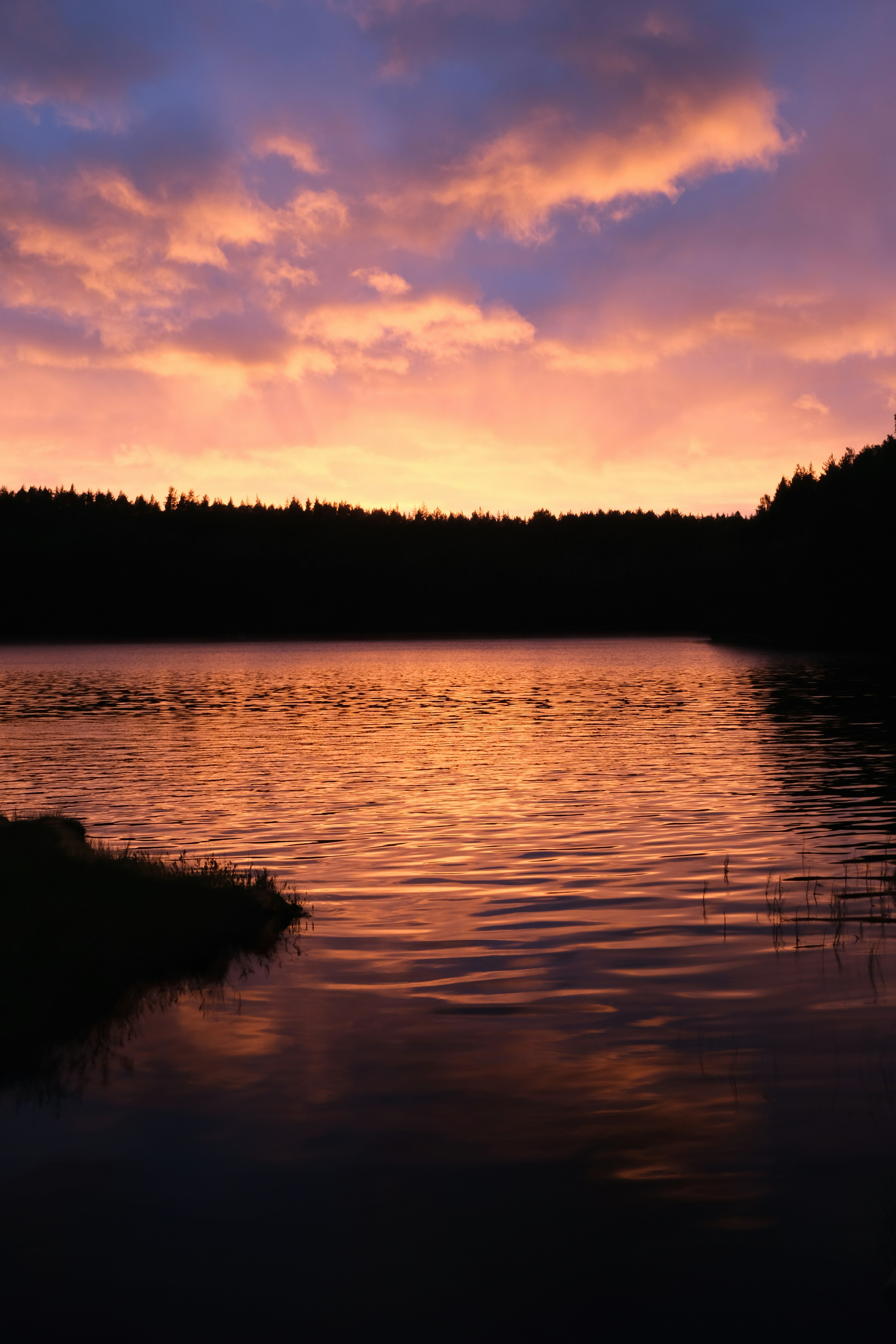 Twin Horizon of Fire: Dusk Over a Quiet Lake