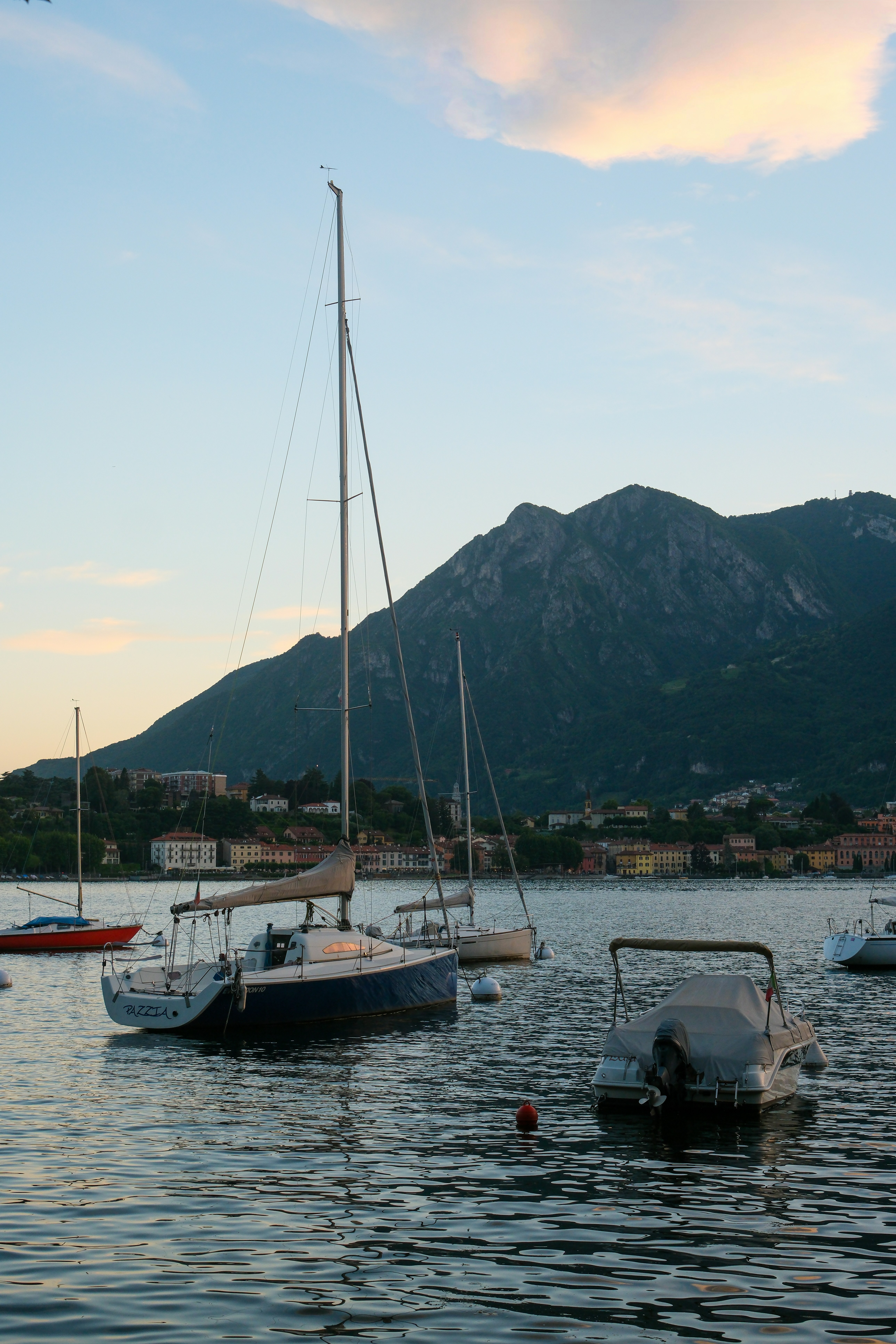 Sails, Stone Saddle: Boats at Dusk on Lake Como Backdrop