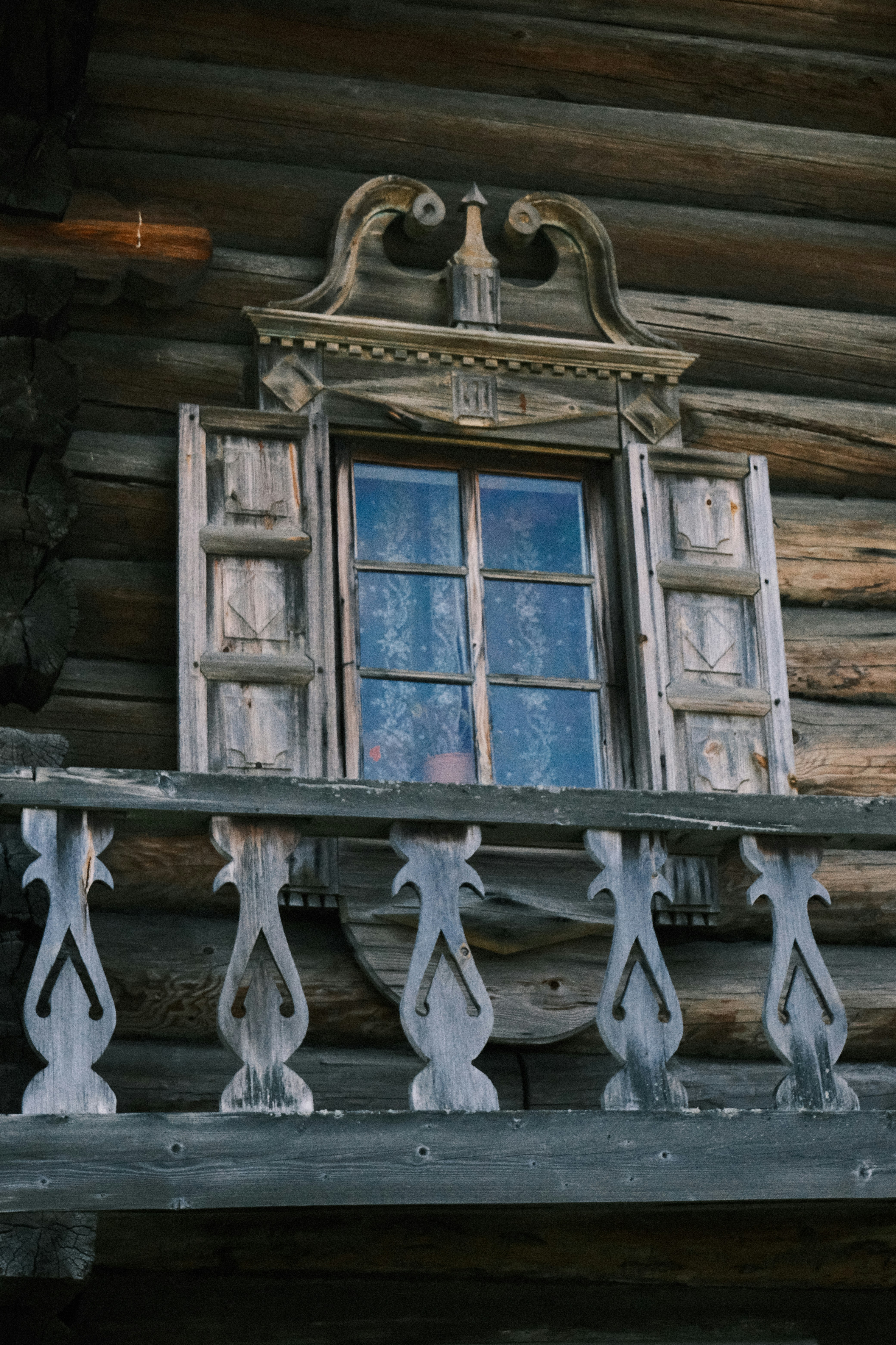 Weathered Window on a Carved Balustrade