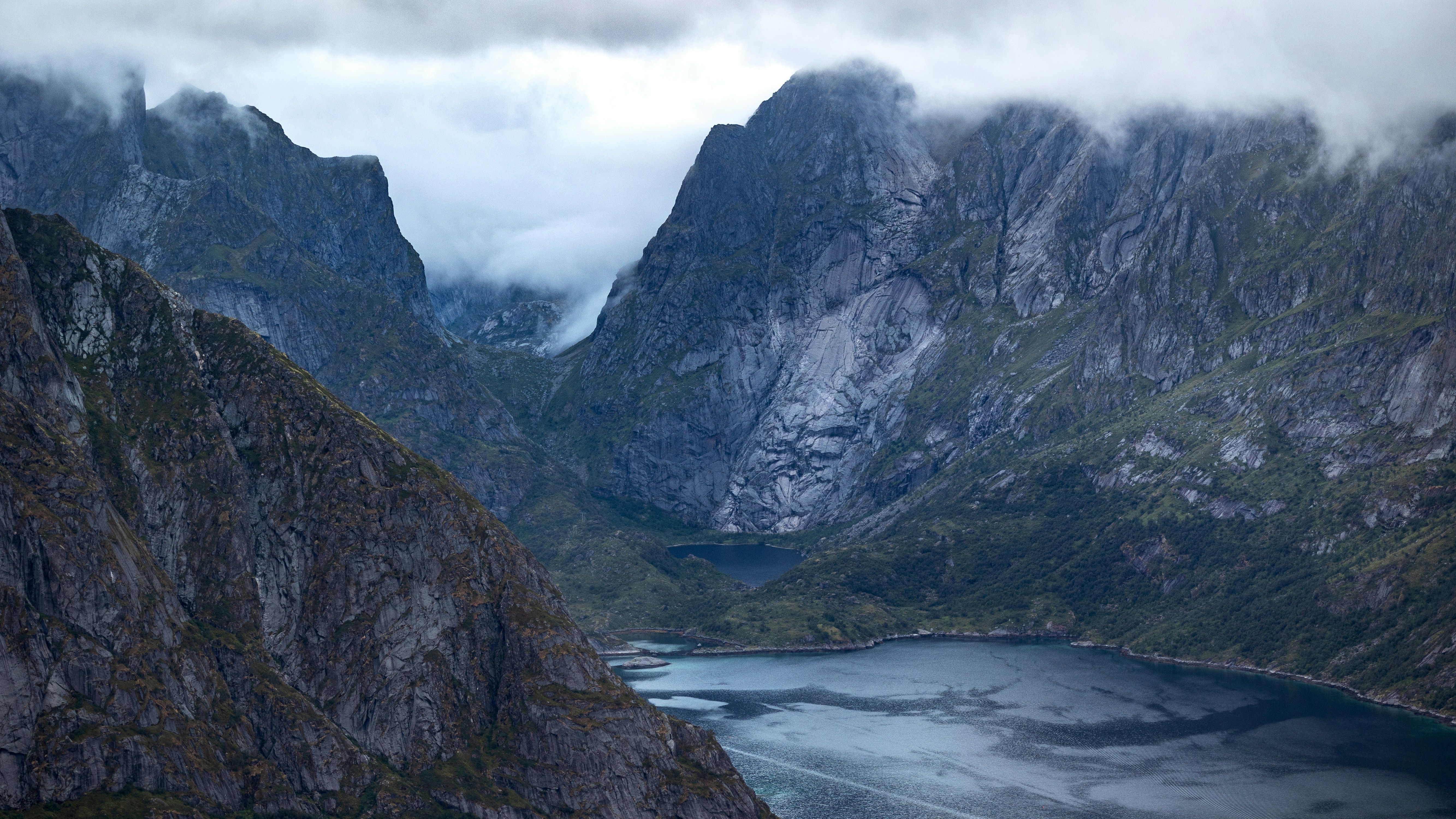 Mid‑valley Echo: A Rain‑Veiled Fjord Between Silent Peaks