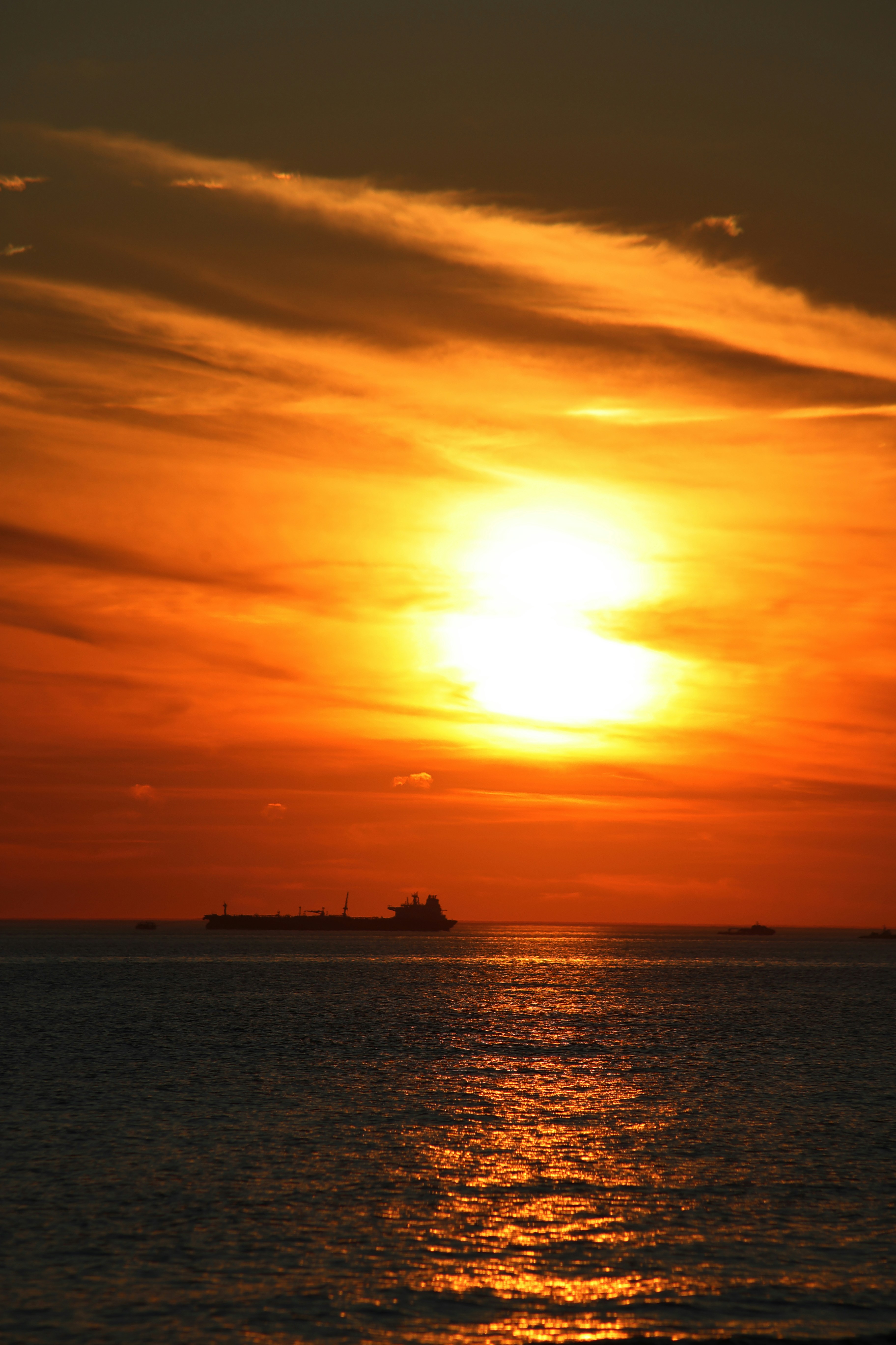 Sunset Frigate Over Quiet Seas