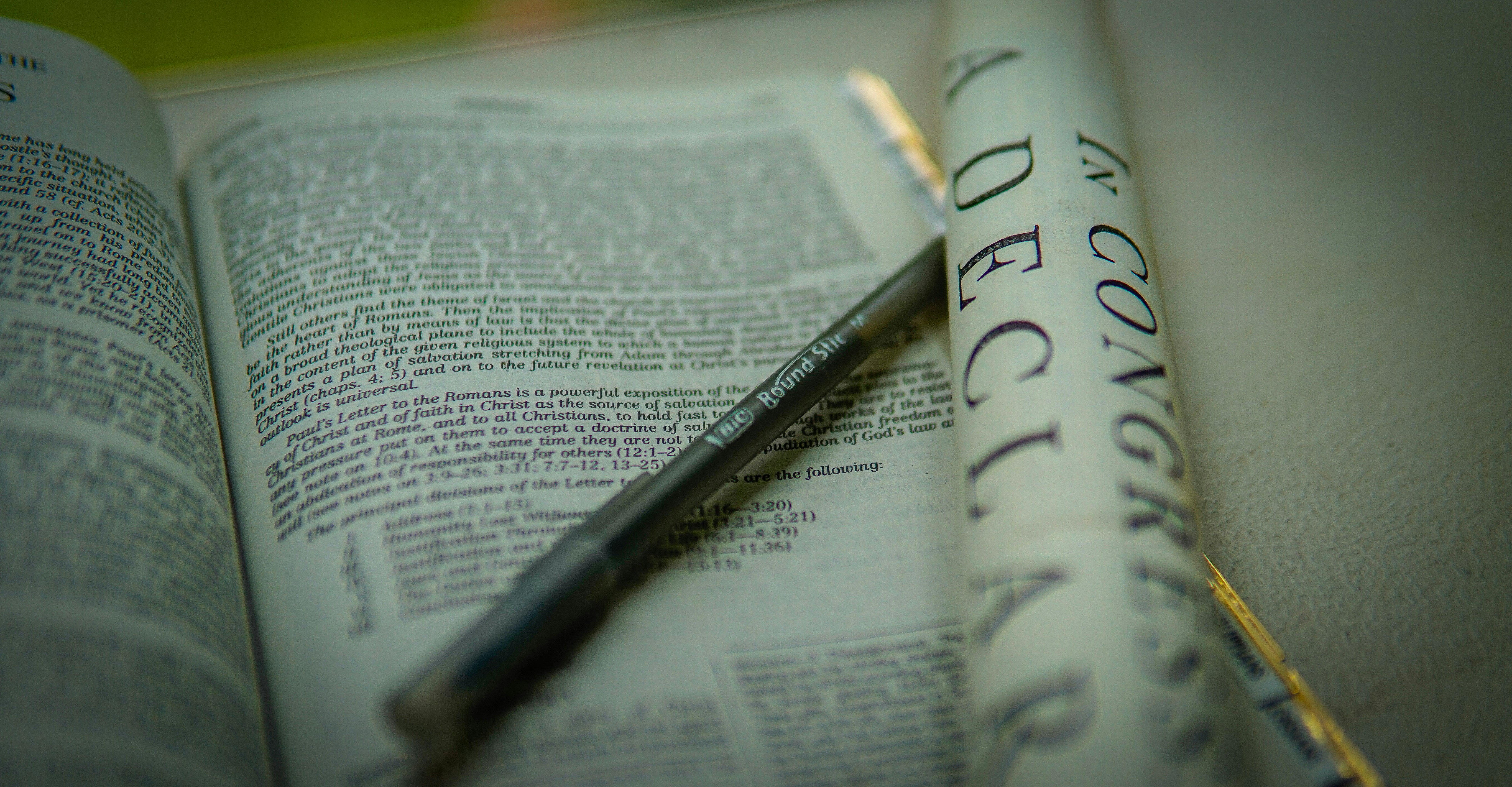 Newspaper Edge with Pen: Quiet Study Moment