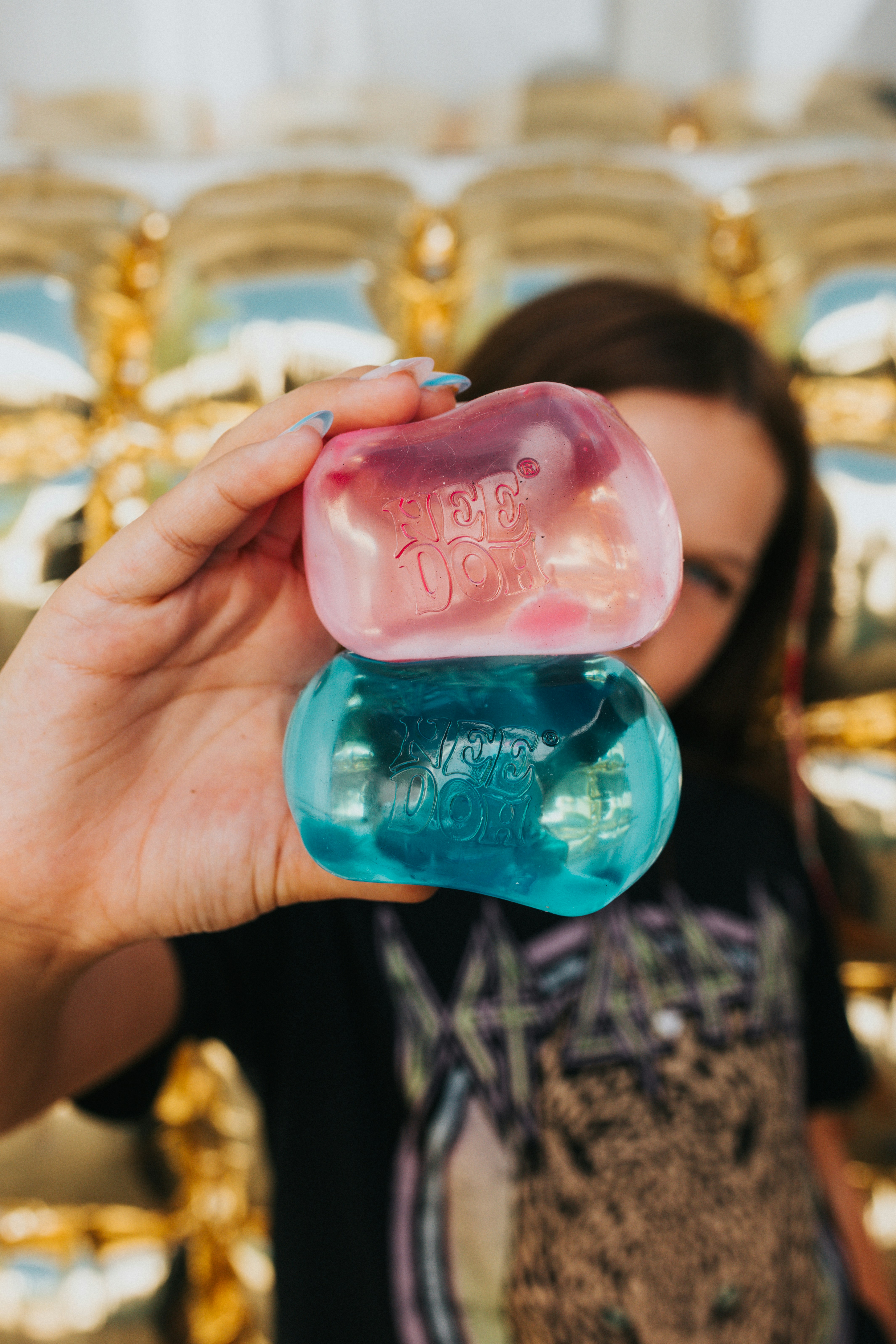 Colorful Soap Duo: A Close-Up Reveal of Playful Bubbles in Hand