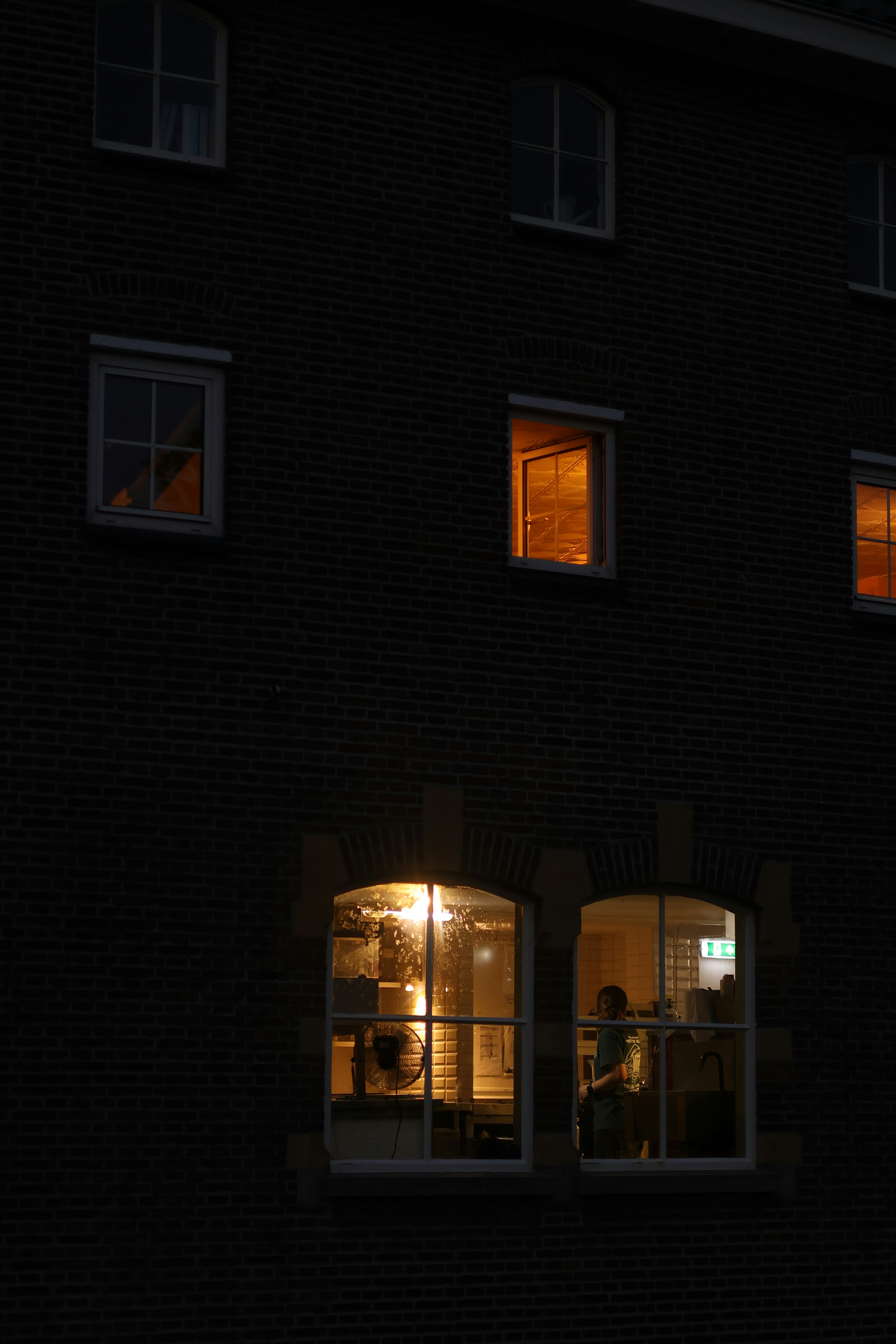 Warm Light in a Quiet Office Window