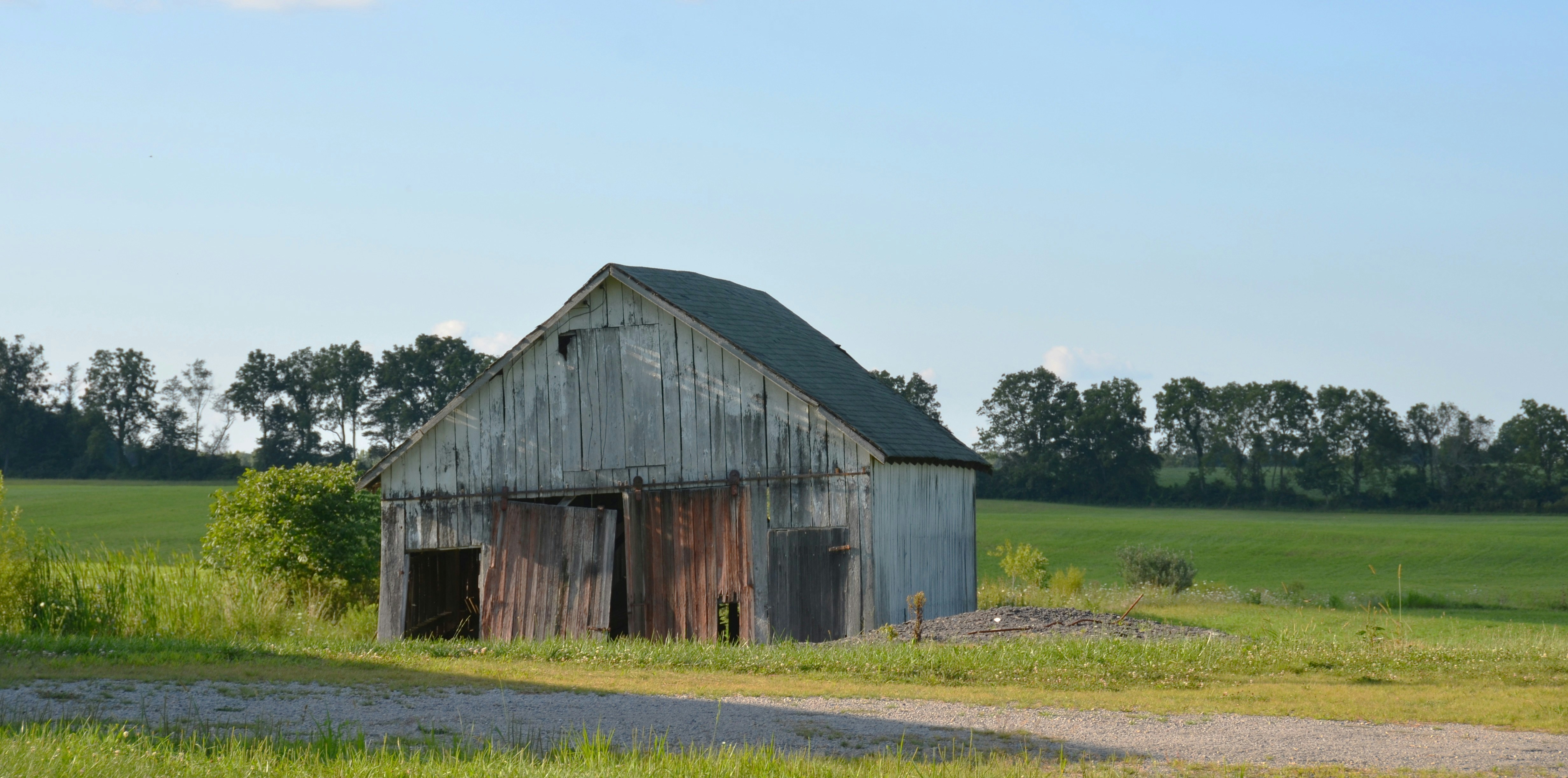 Weathered Barn Standing Guard Over a Quiet Field