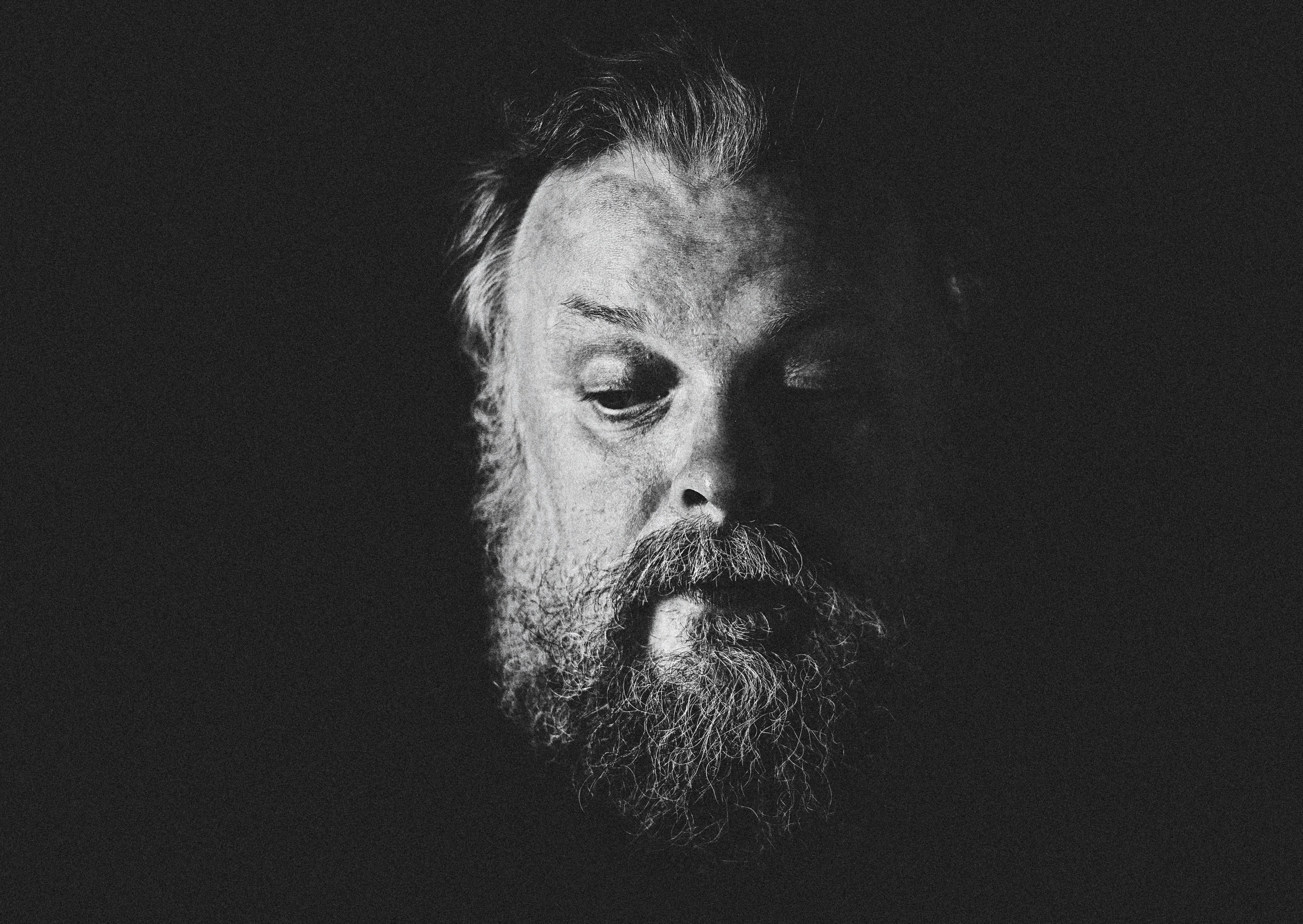 Silhouette of Solitude: The Beard and Gaze in Low Light