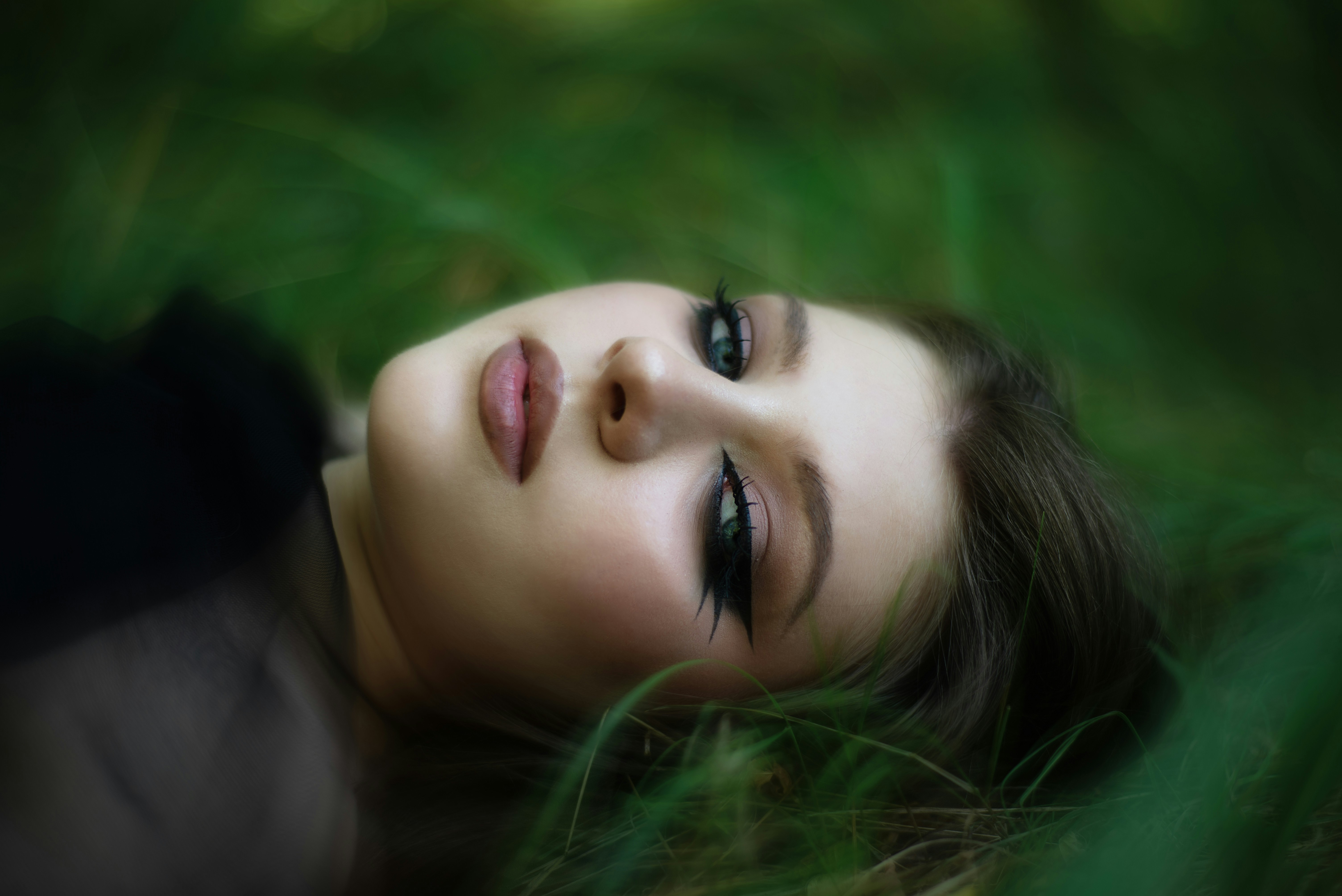 Lying in the Green Velvet: A Quiet Gaze Under Grass