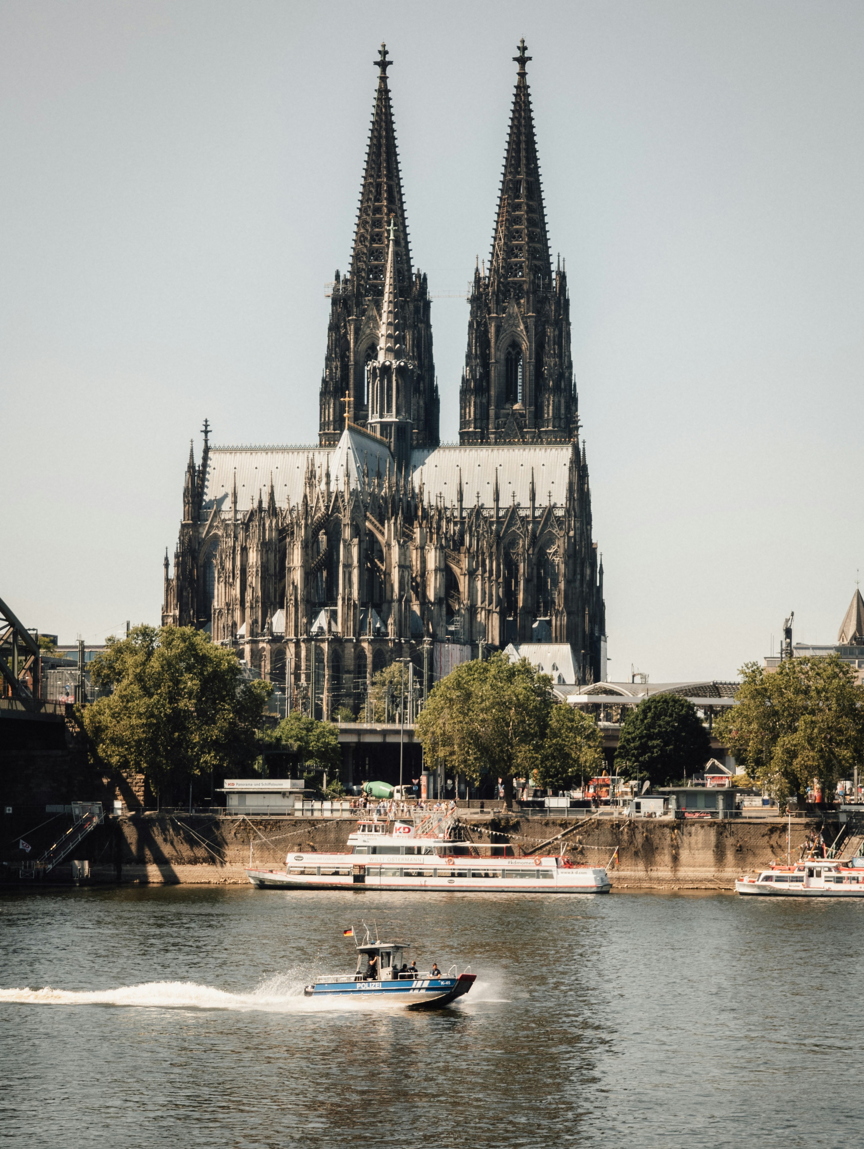 Gothic Giants Over the River: A Cathedral Dominates the Skyline