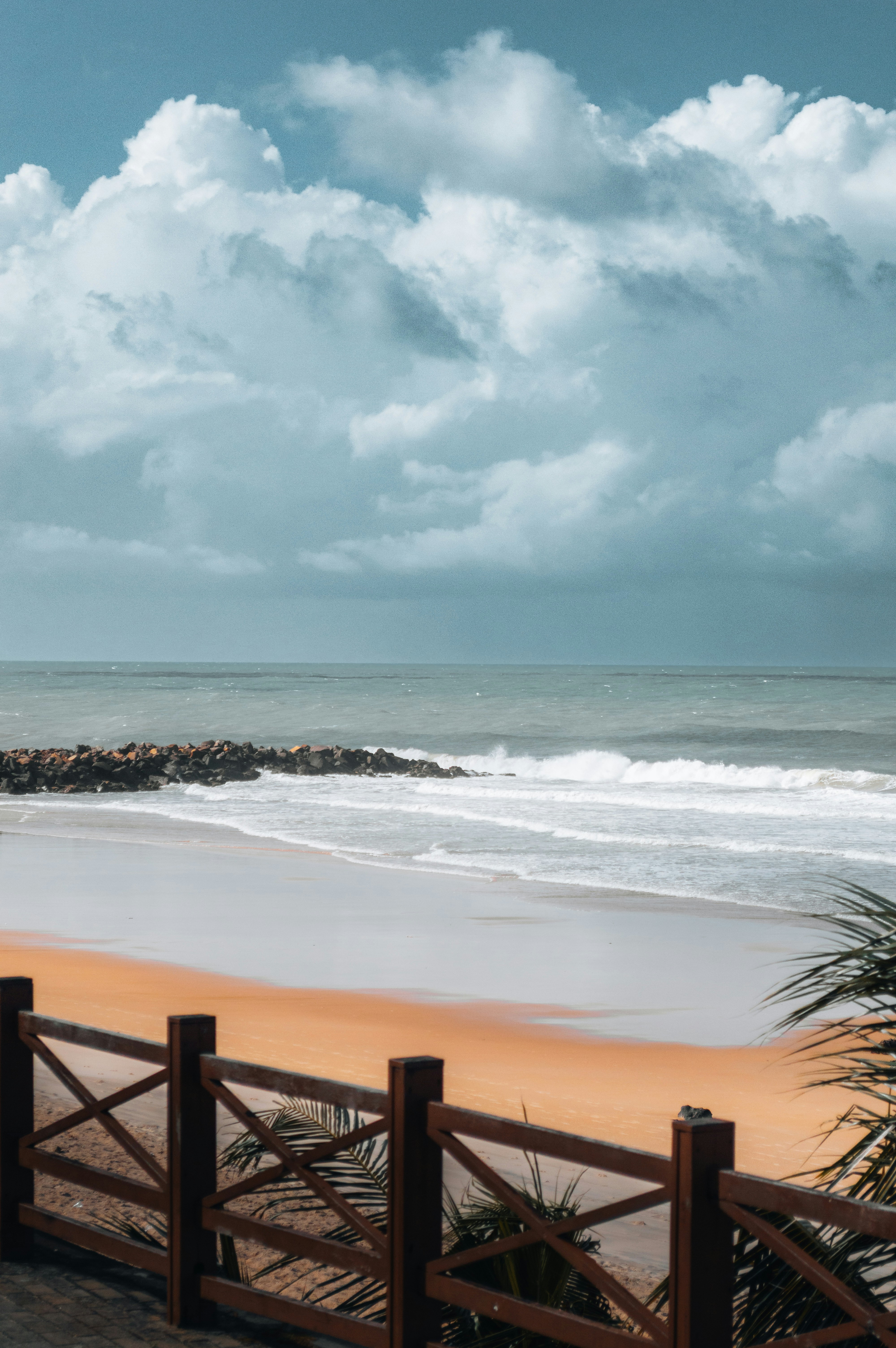 Sea Fence at Sunset: Calm Beach with Ocean Breeze