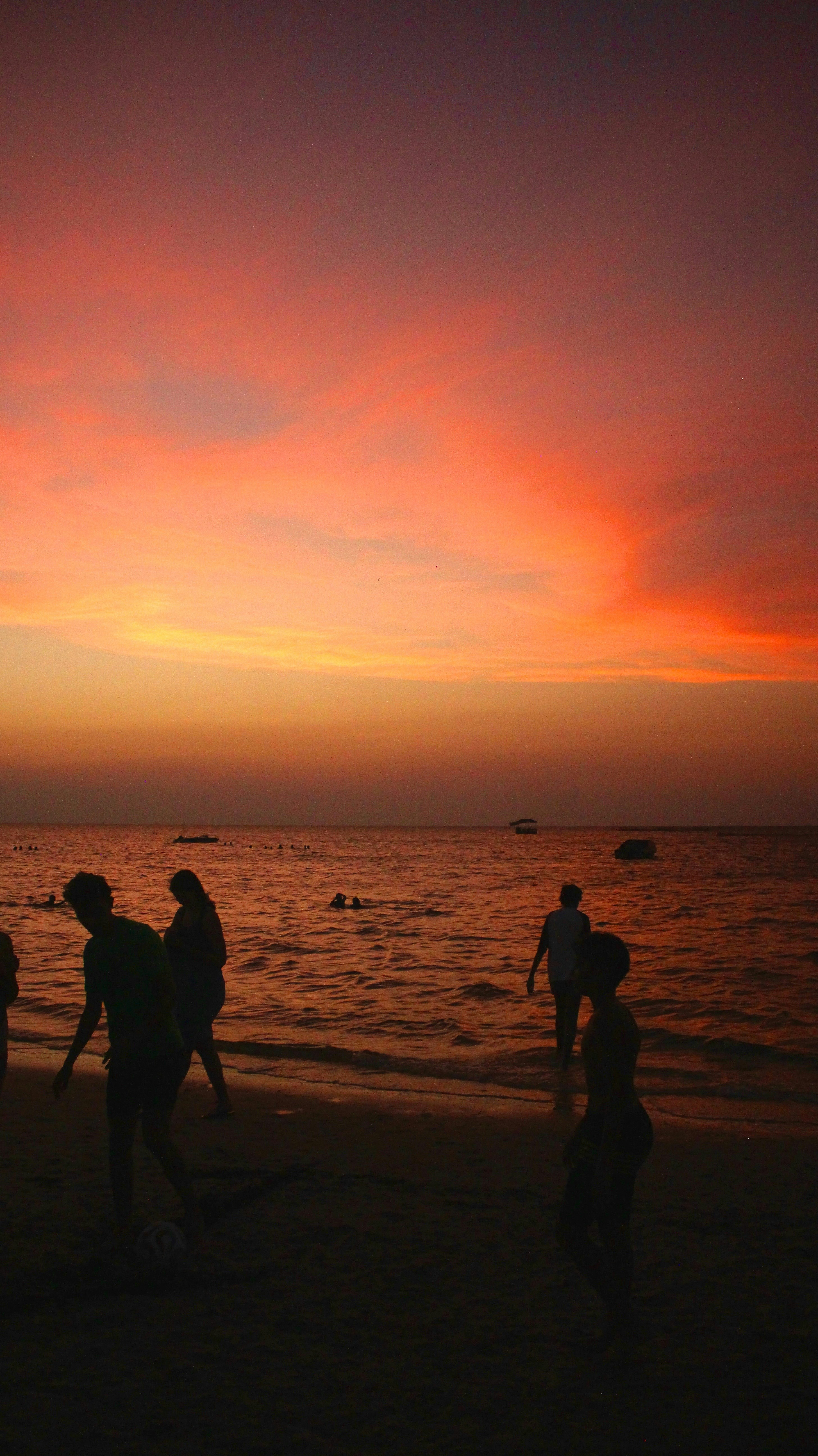 Sunset Silhouettes on a Quiet Beach