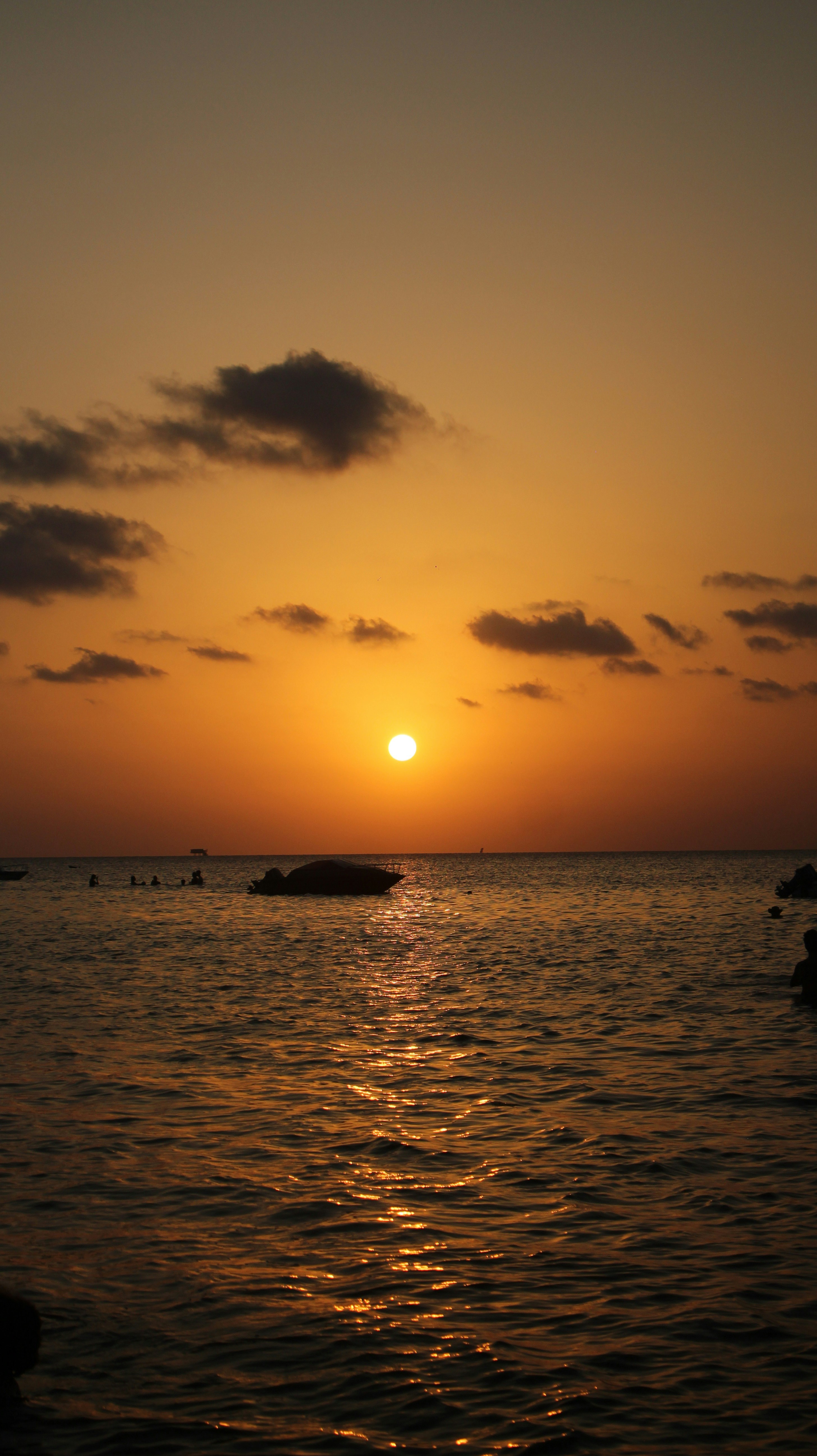 Sunlit Horizon: Quiet Resolve Over a Calm Sea