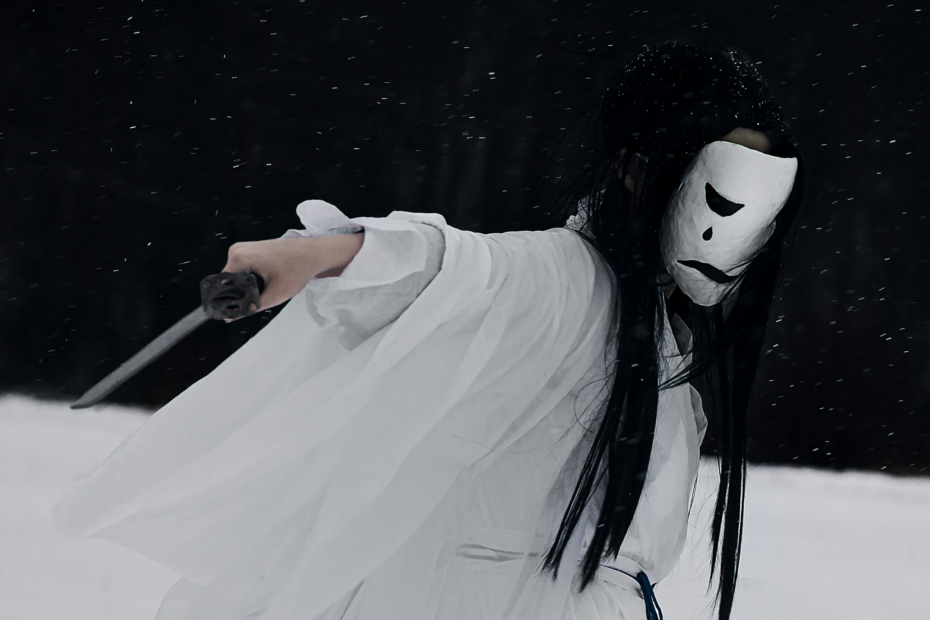Masked Rider in the Snow: A Silent Stroke of White and Shadow