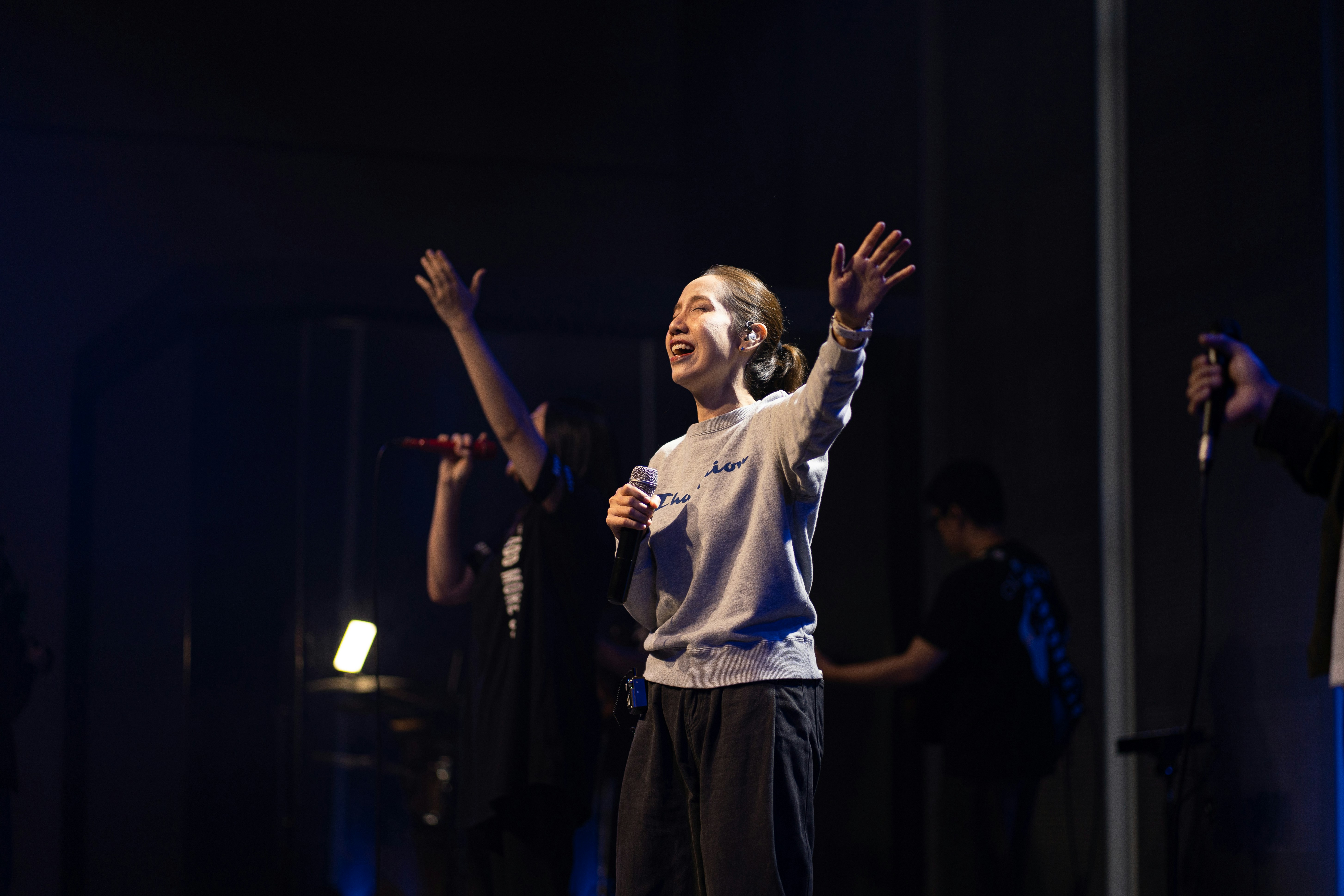 Raise Your Voice: A Solo Performer Under Stage Lights