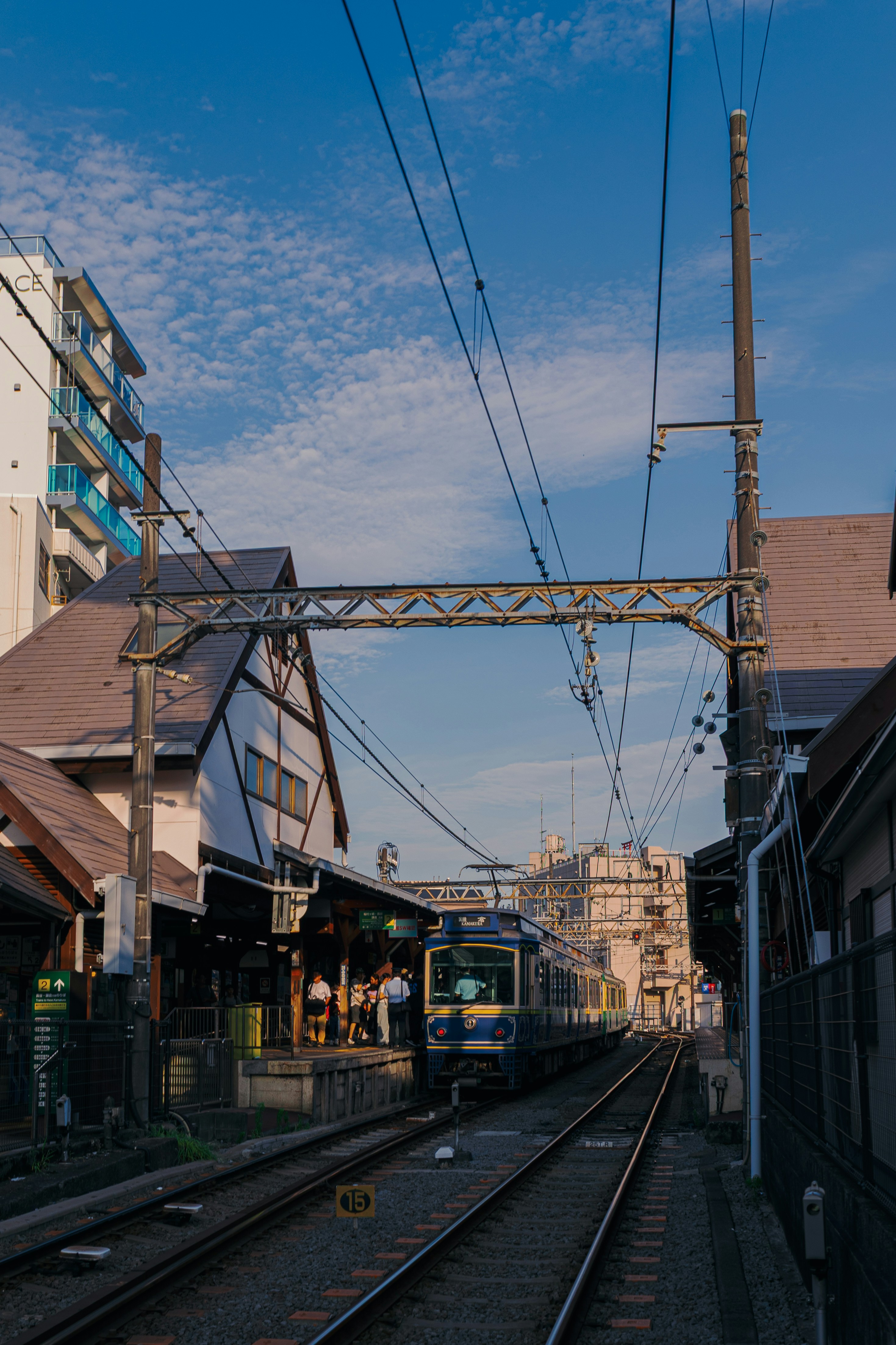 Railway at Dusk: The Commuter Platform as Trains Thread the City