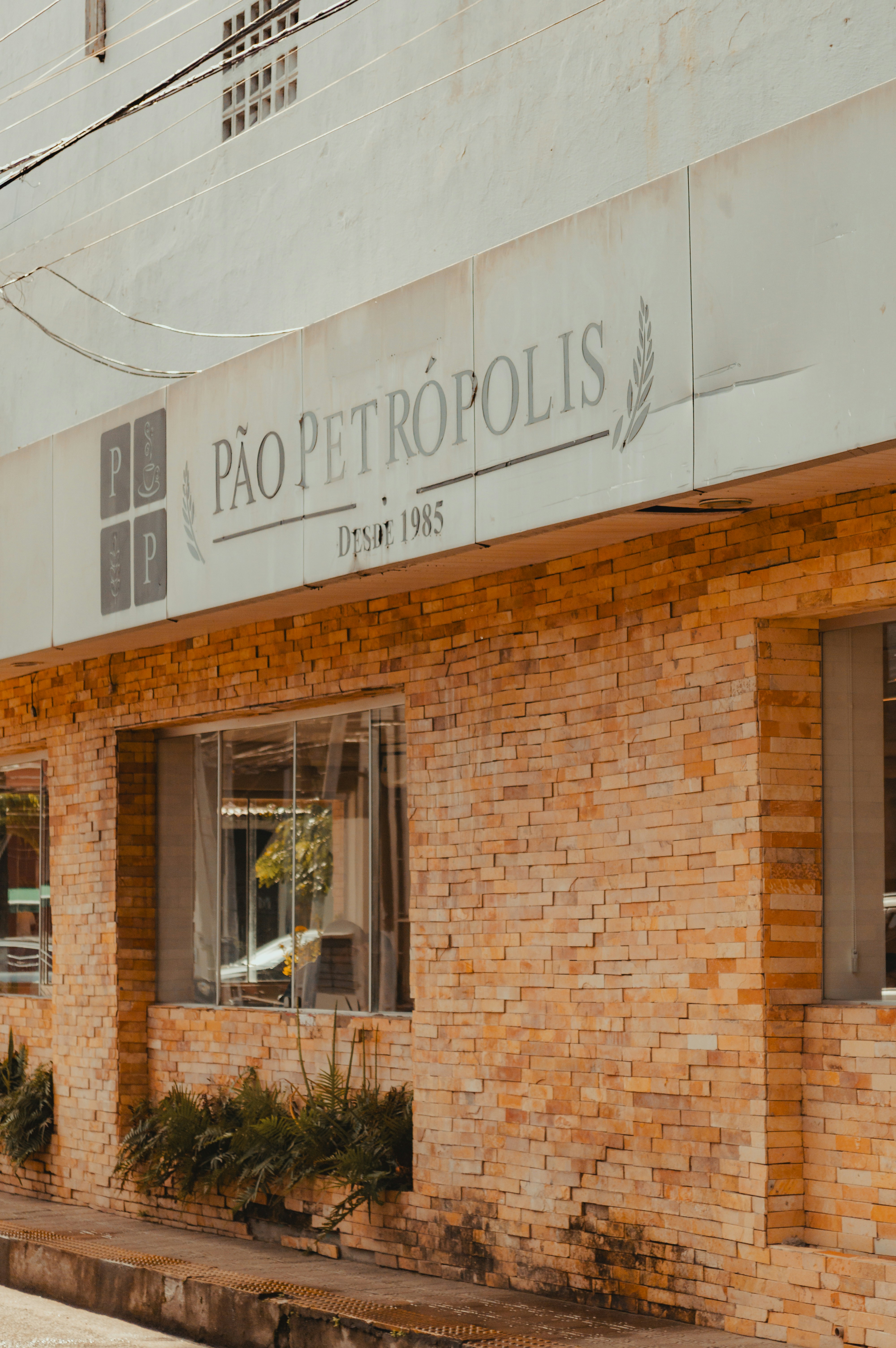 Brick-Front Boutique: Pao Metropolis Sign and Storefront