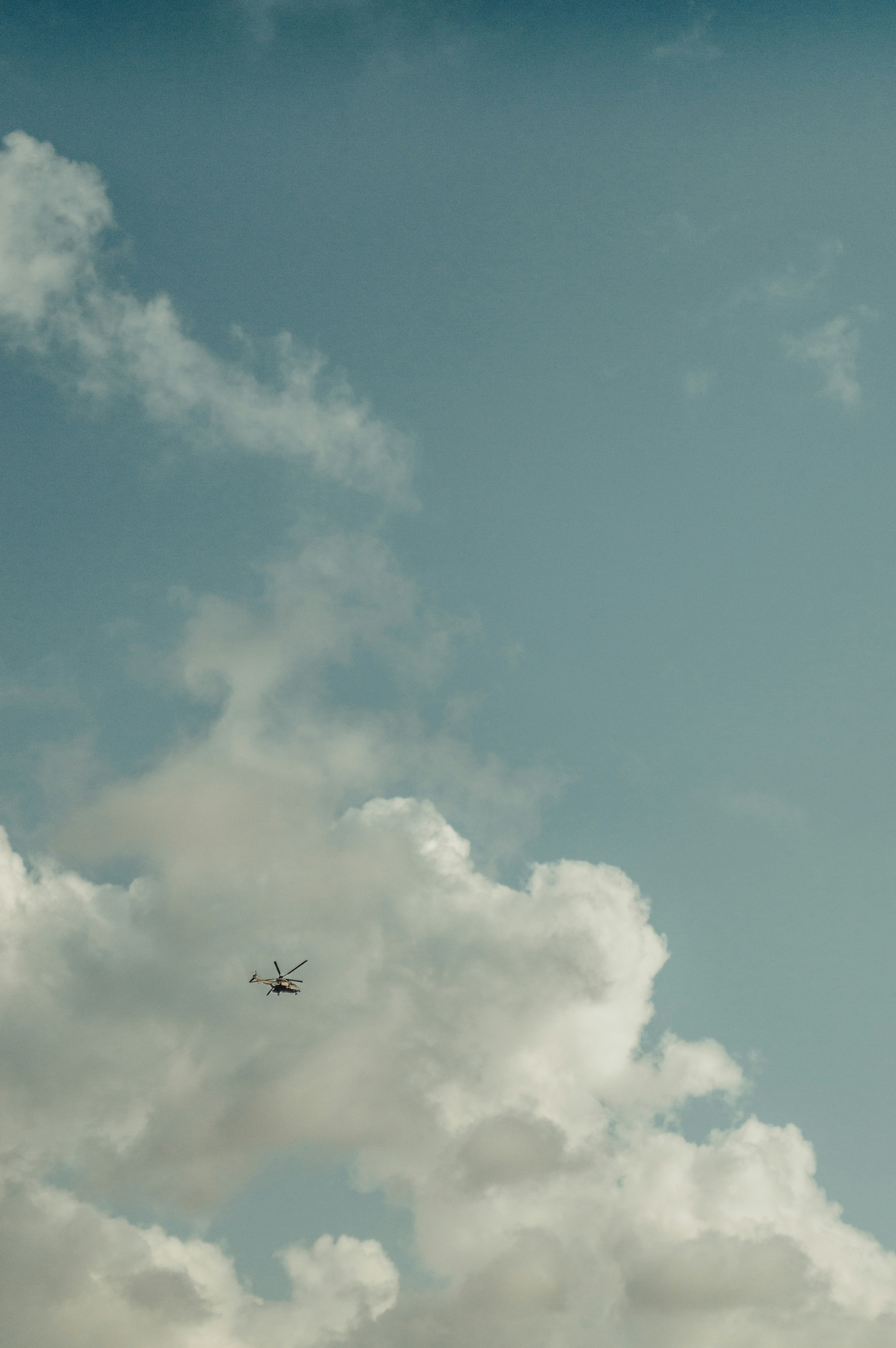 Low-Sky Drone: A Helicopter Dwarfed by Cumulus