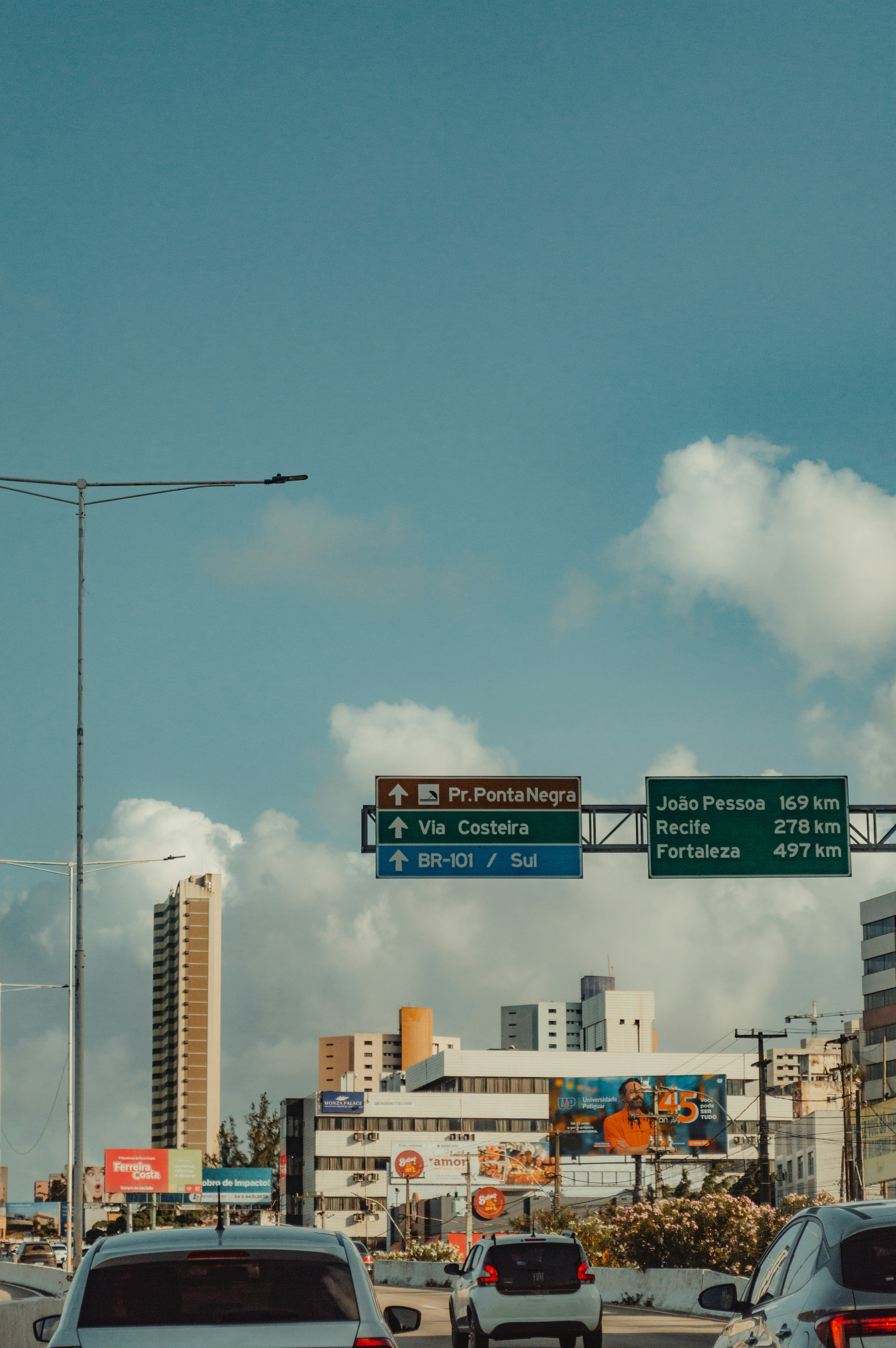 Highway Signs Under a Clear Brazilian Sky