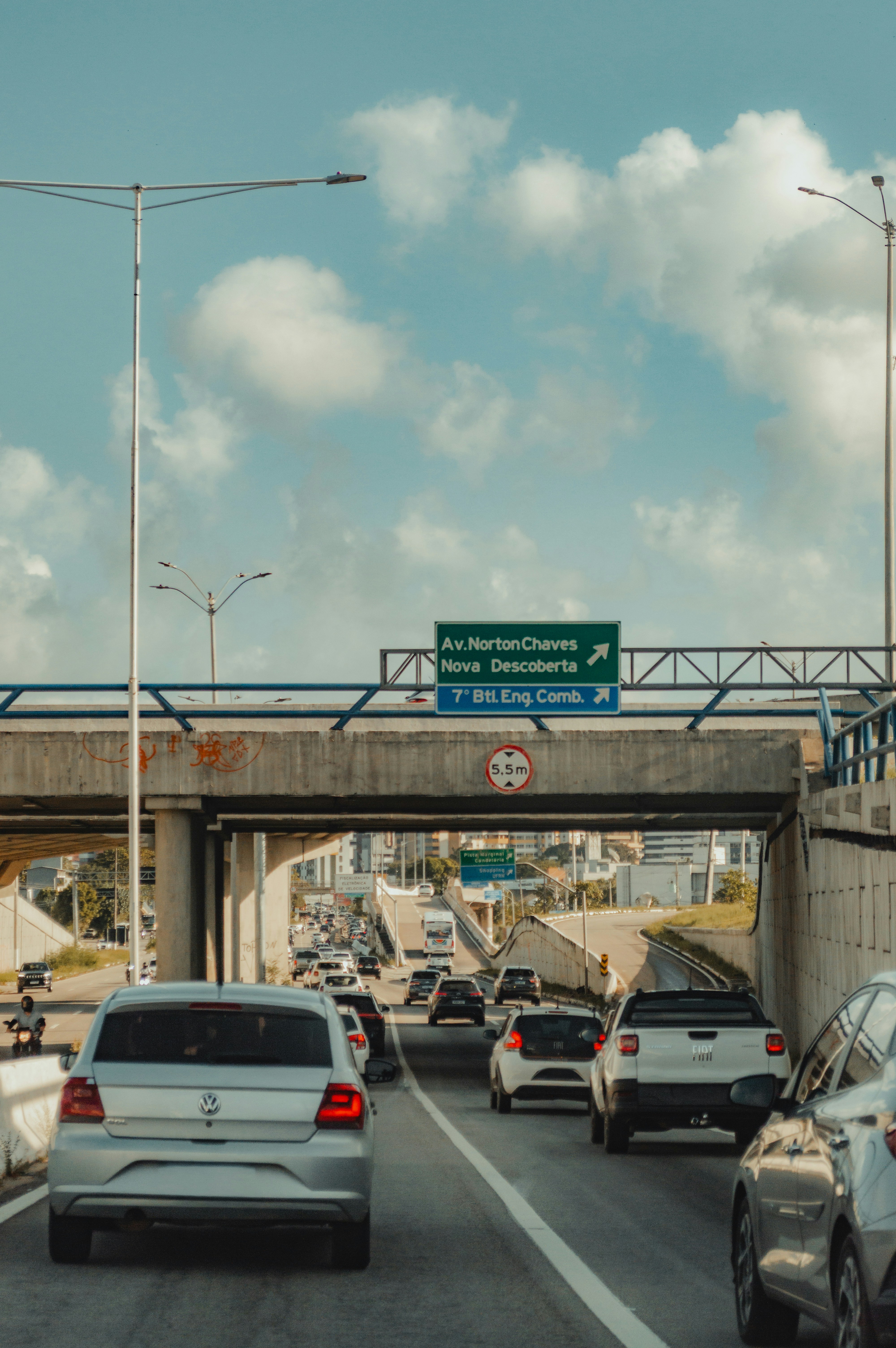 Highway Overpass: A Corridor of Moving Steel and Light