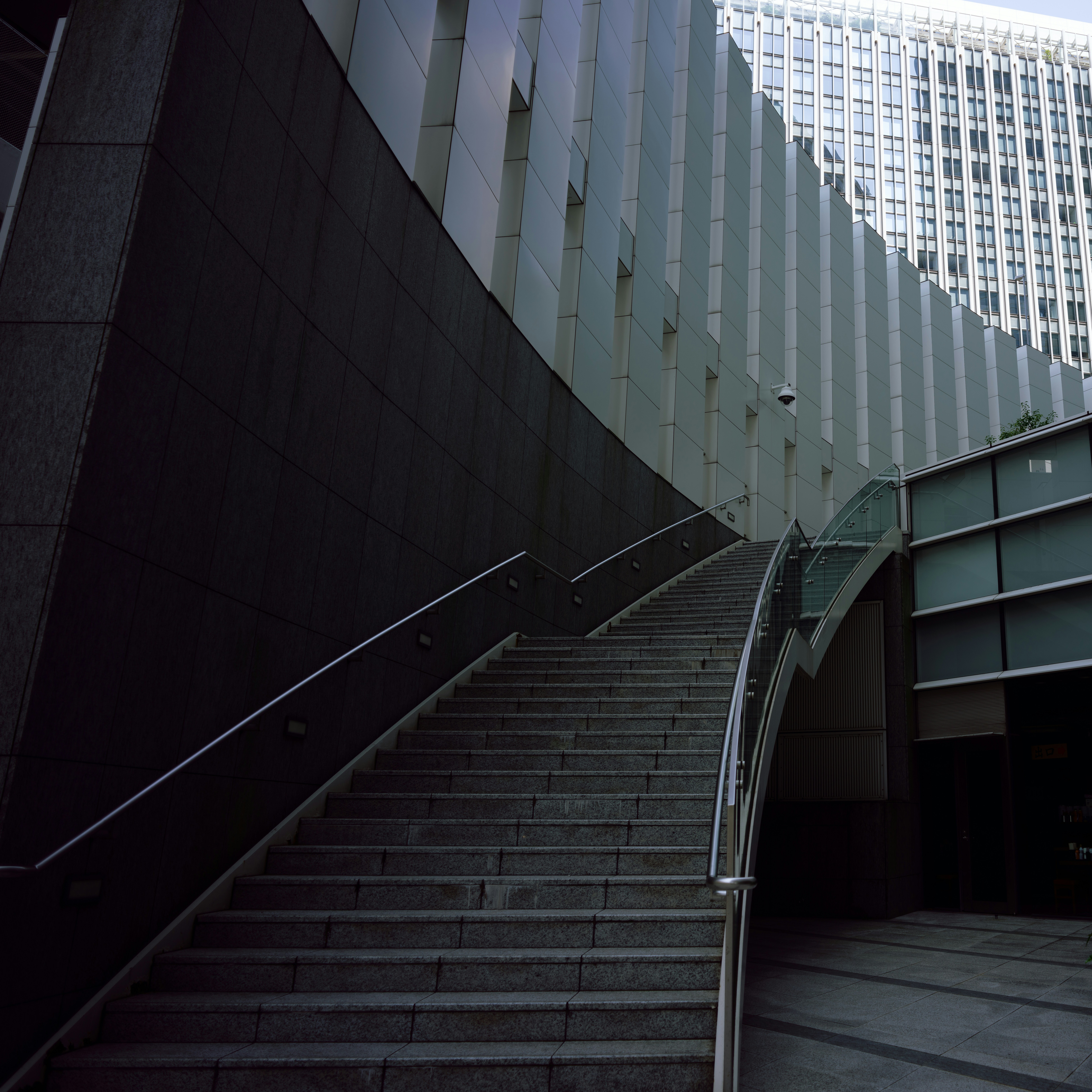 Urban Ascent: The Long Staircase Toward a Latticed Sky