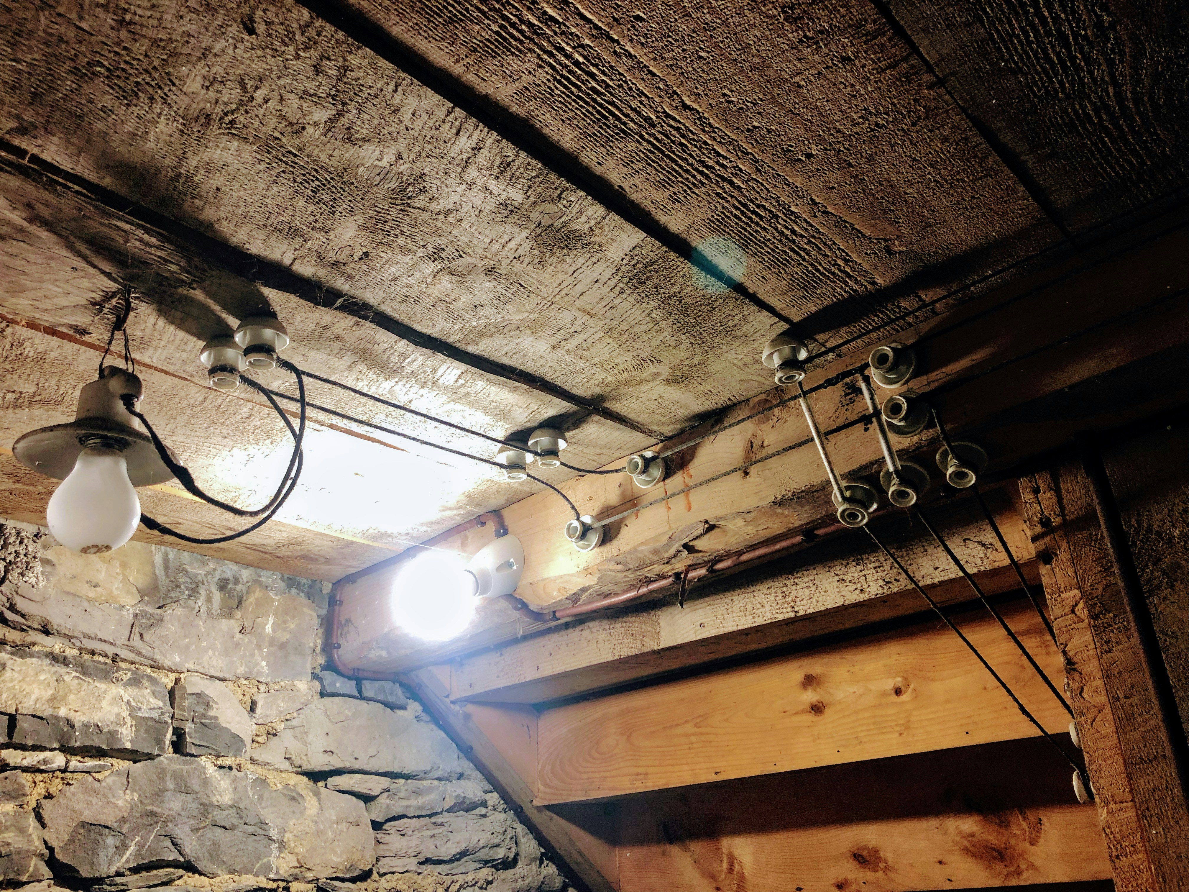 Low Ceiling, Warm Sparks: A Rustic Basement Aglow
