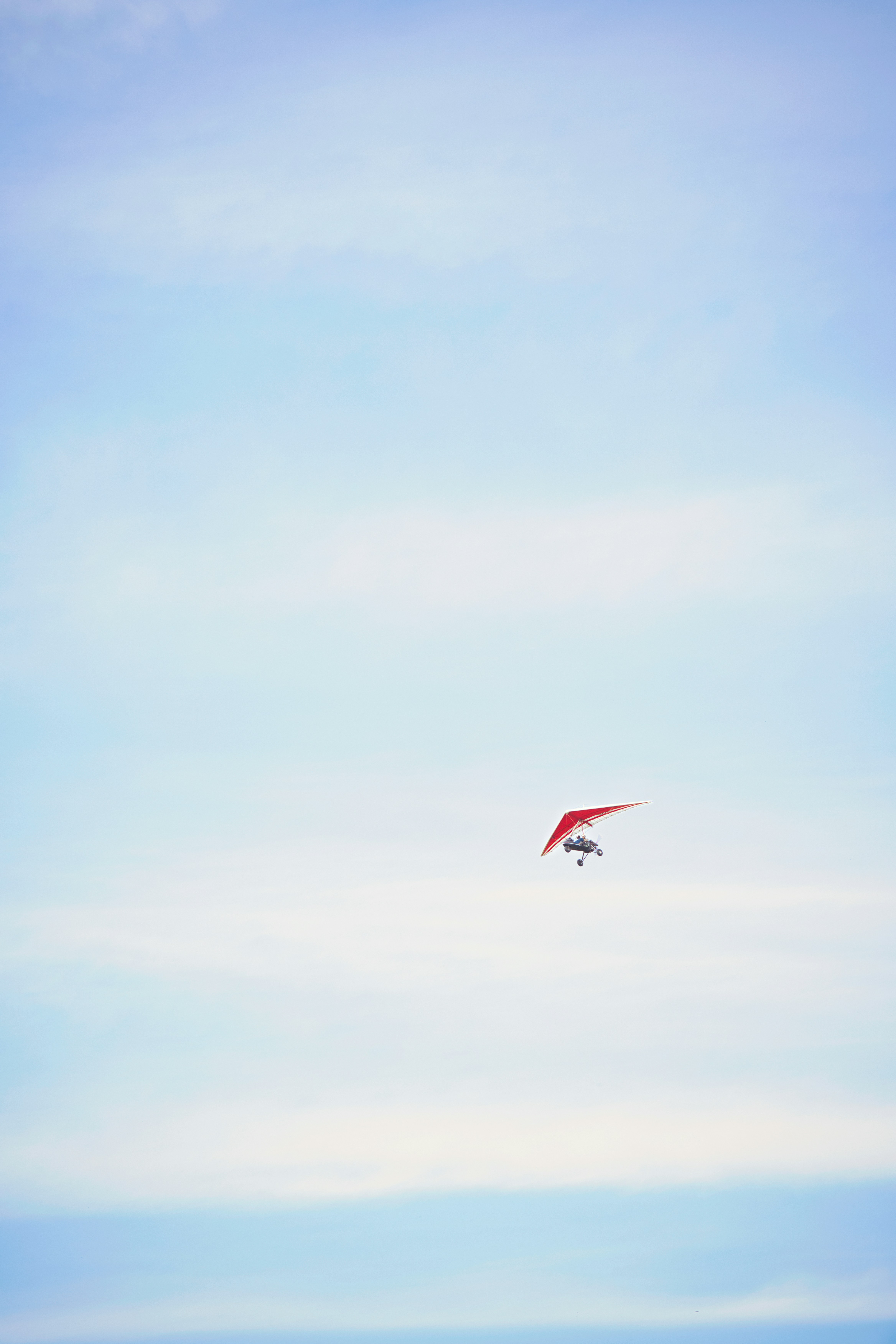 Red Delta in a Sky of Soft Blues