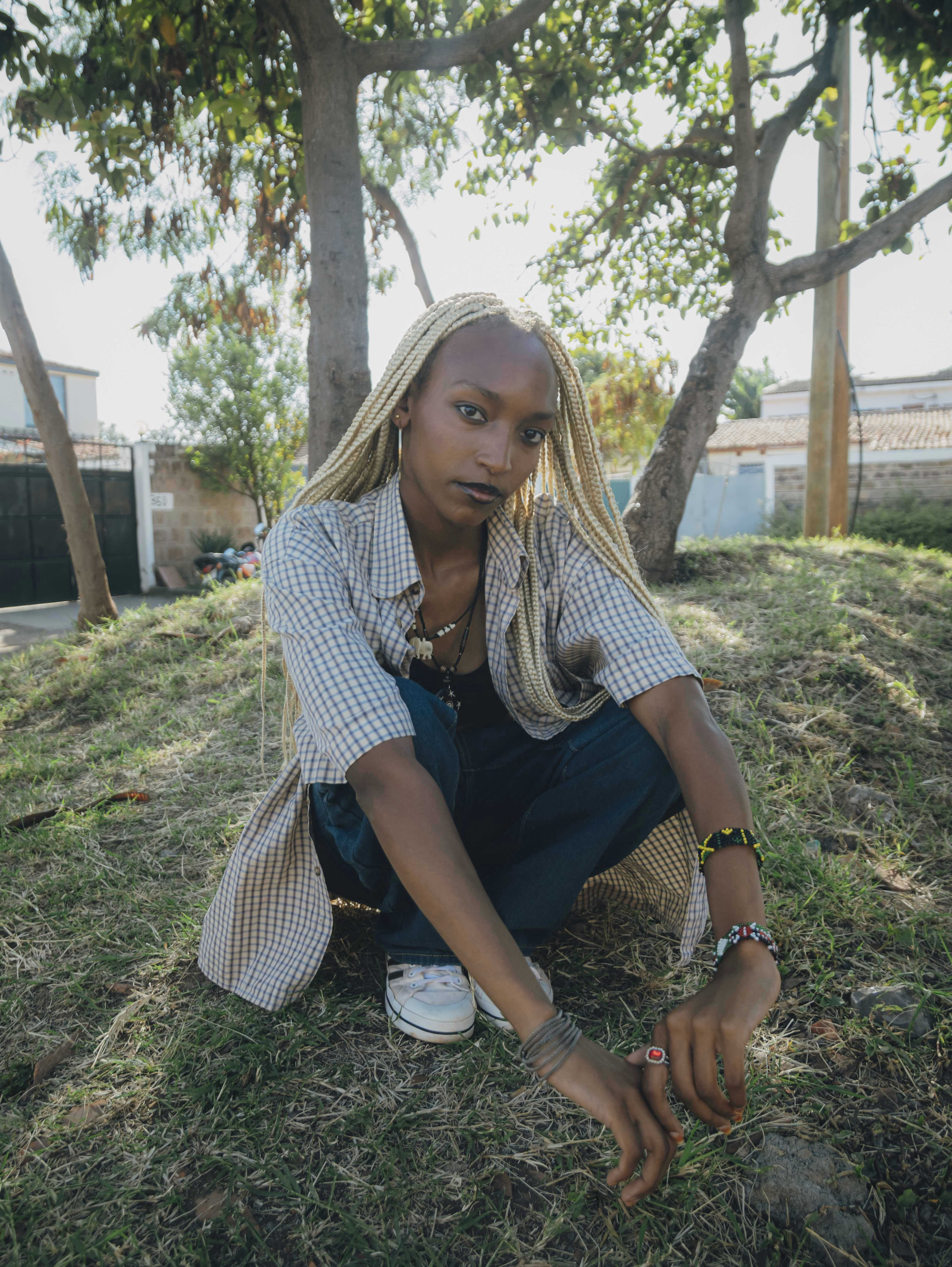 Portrait Under The Orchard: A Youthful Gaze and Braided Glow