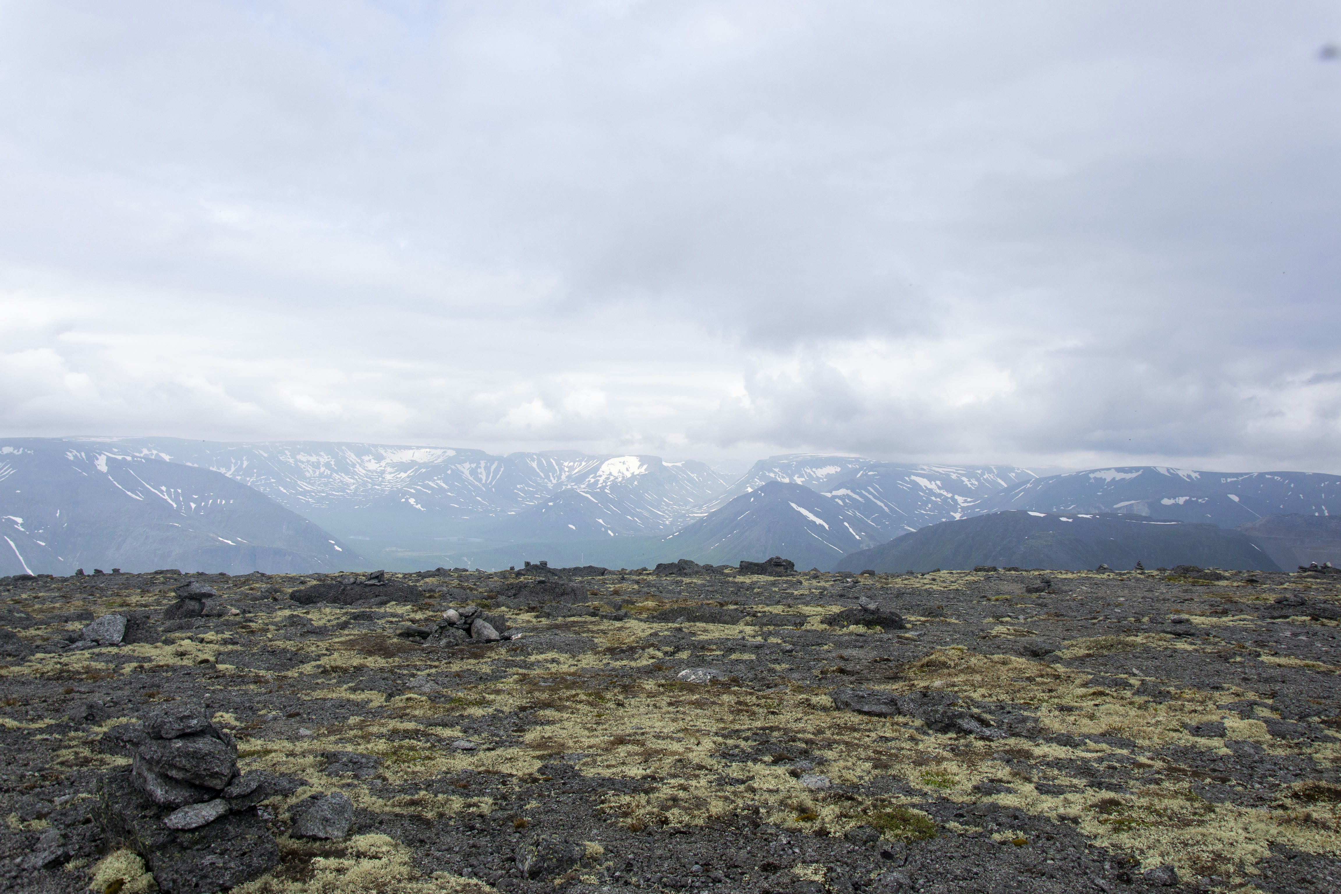 Lava Plain Toward Snow-Capped Horizons