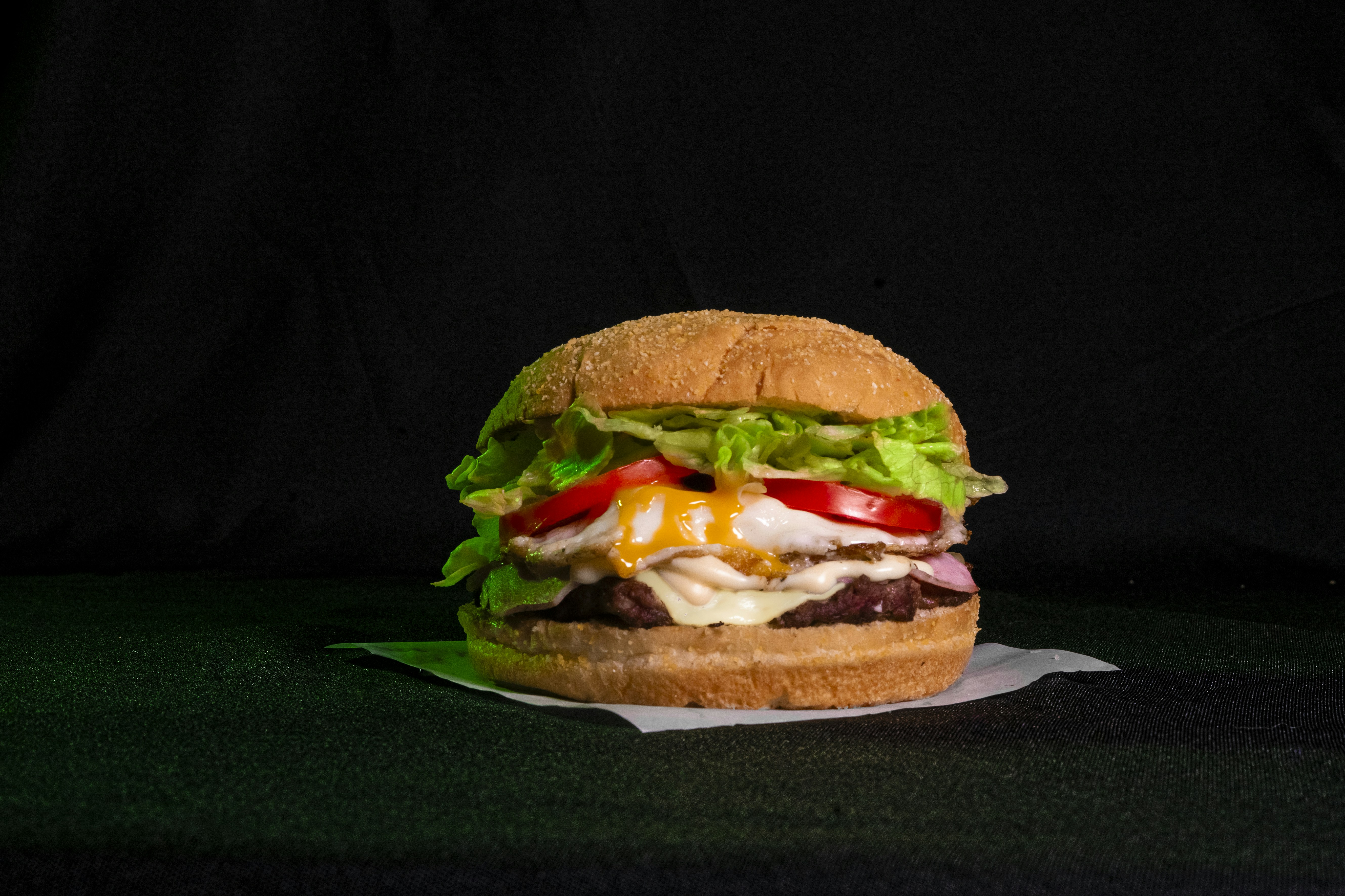 Juicy Crown: A Classic Cheeseburger Bask in Studio Light