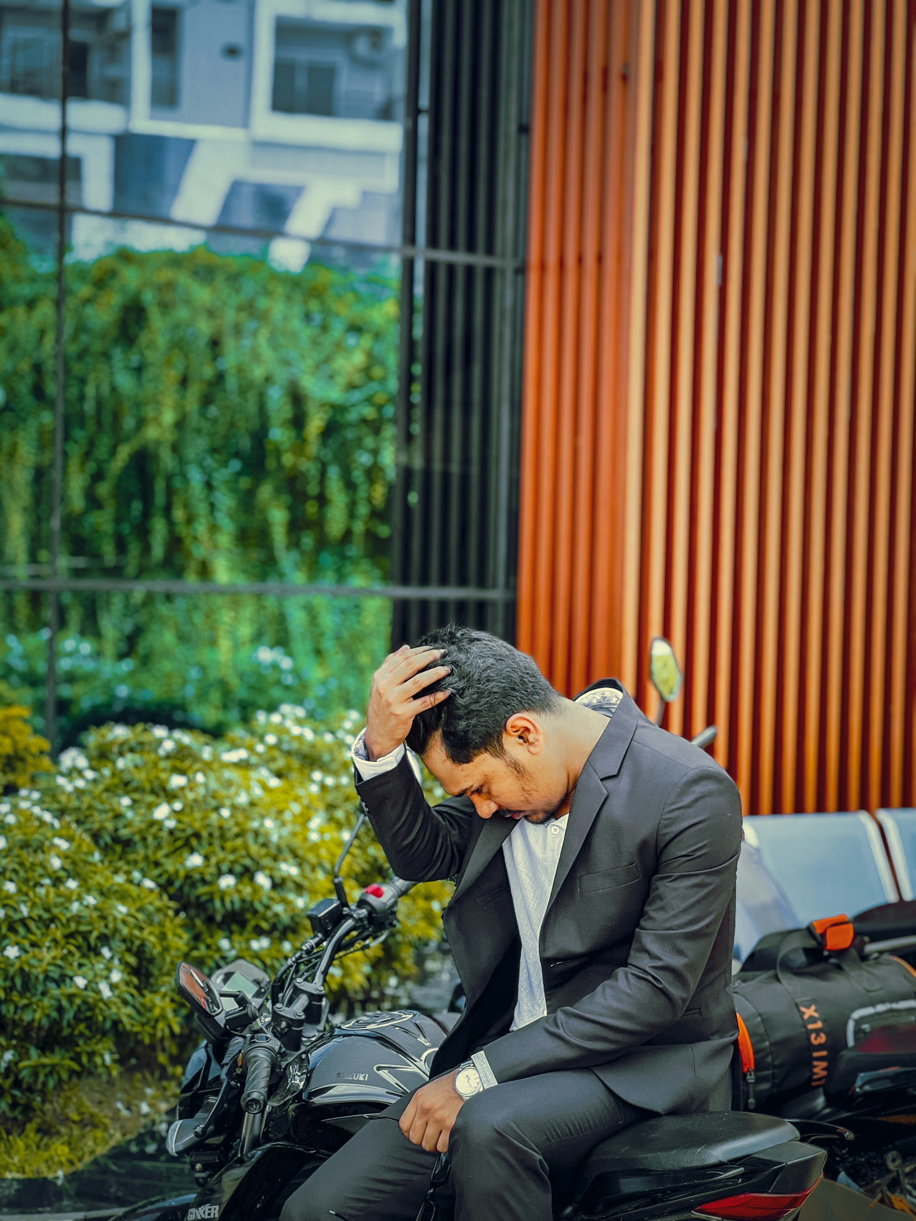 Relief in a Quiet Moment: A Groom Pause on the Bike