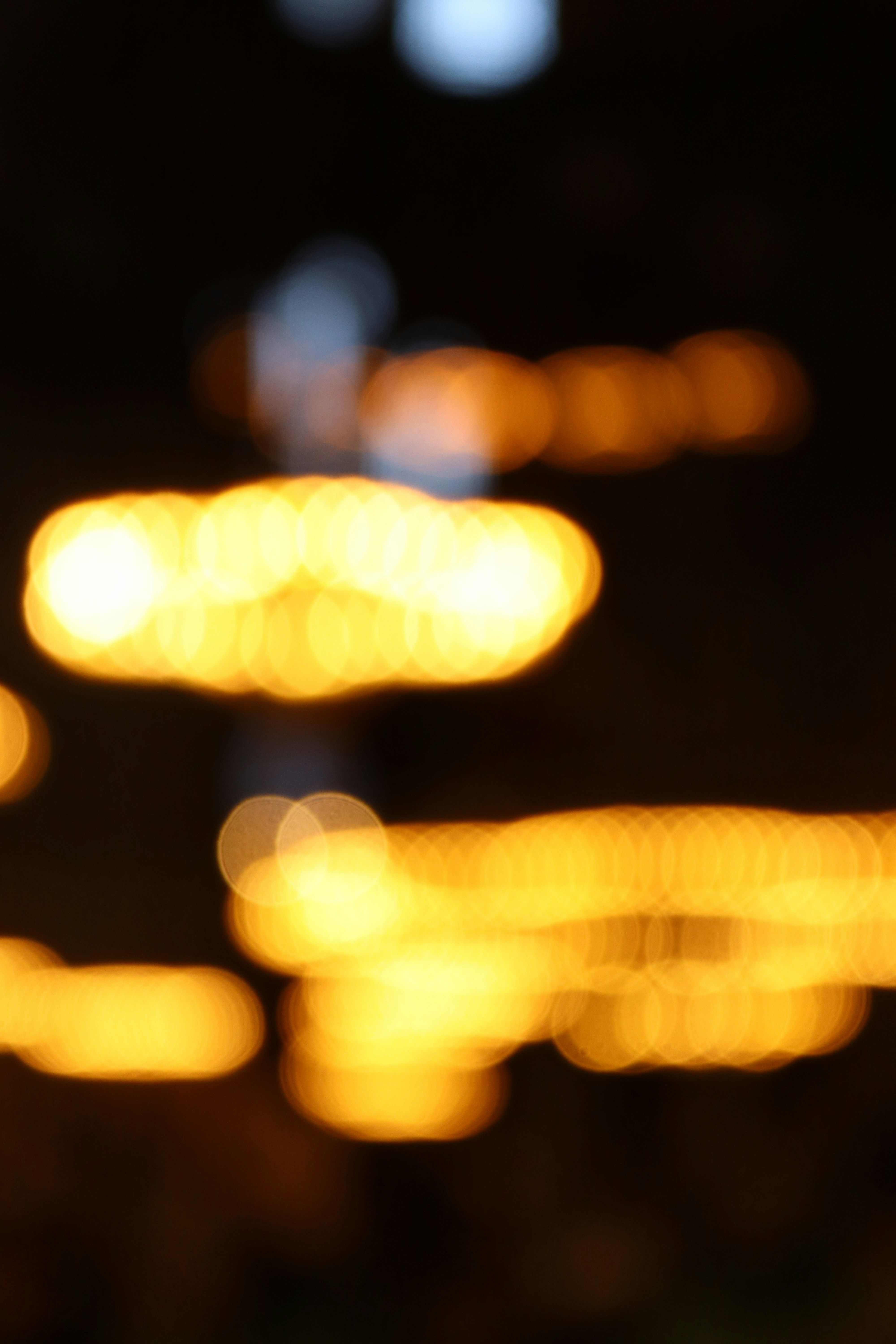 Glowing Orbs in a Nightscape: A Blur of Lantern Warmth