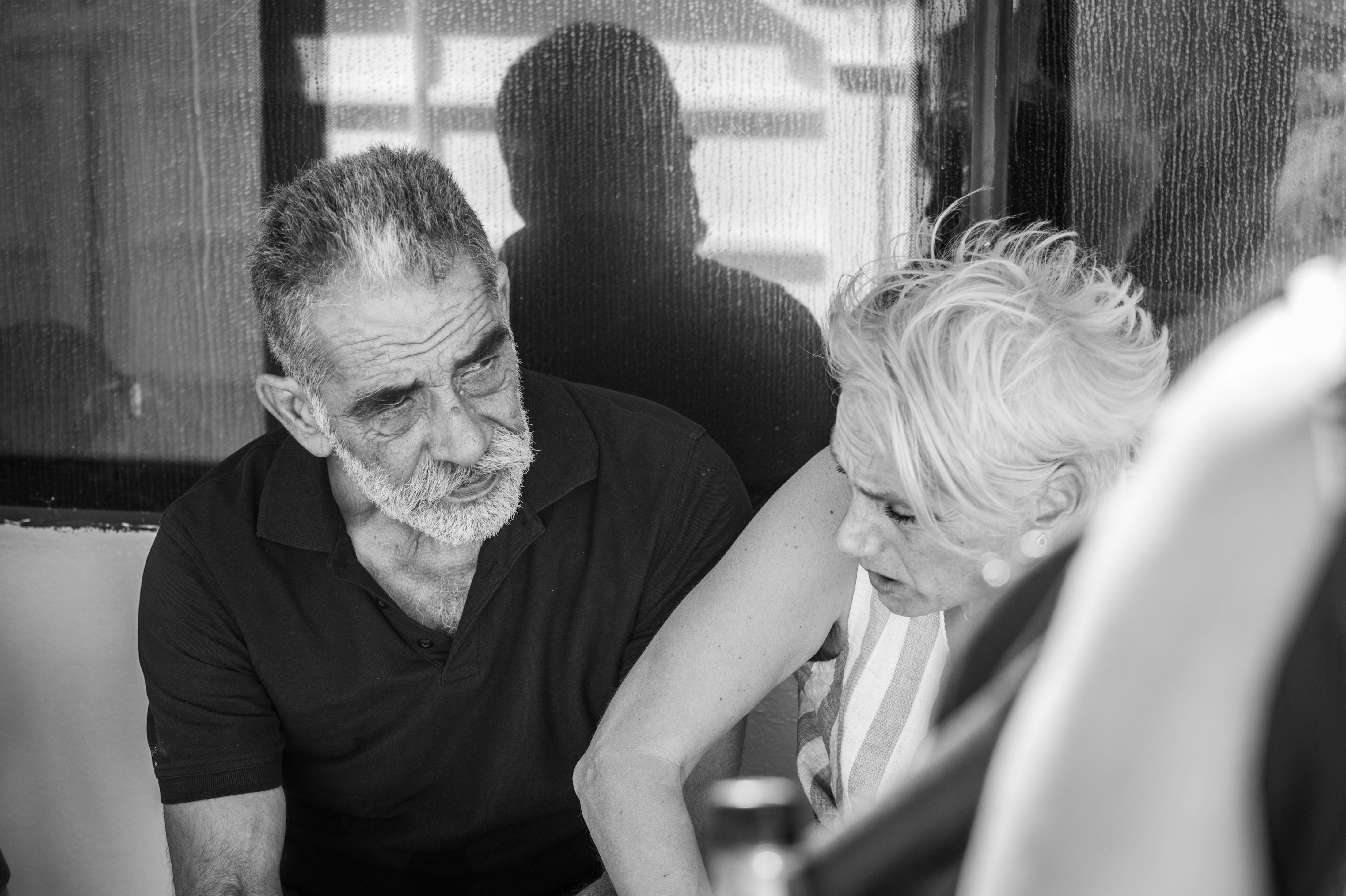 Quiet Exchange: Aged Faces in Conversation