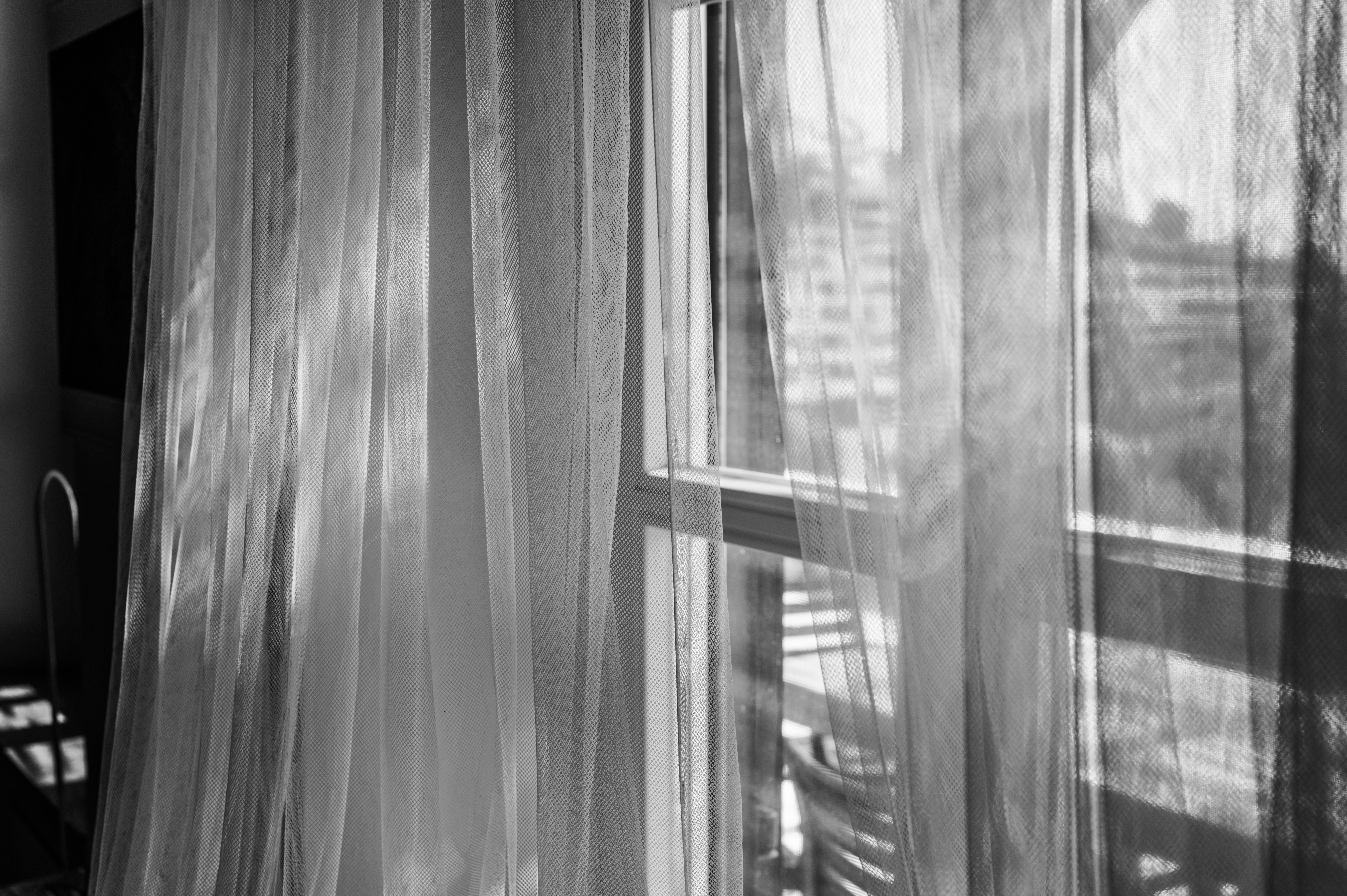 Veiled Window: Light, Layered Sheers and City Grains