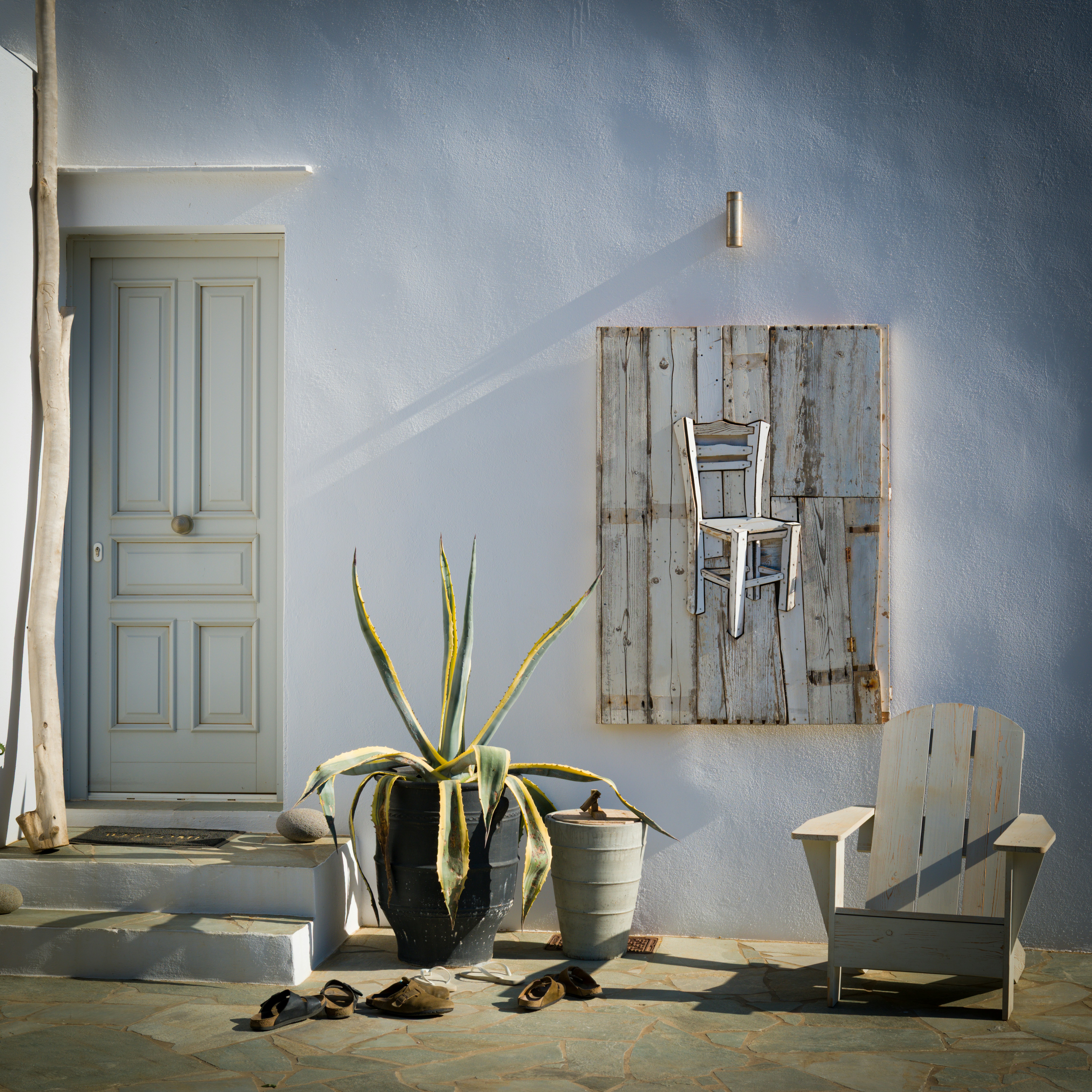Shadows and Solace on a Sunlit Terrace