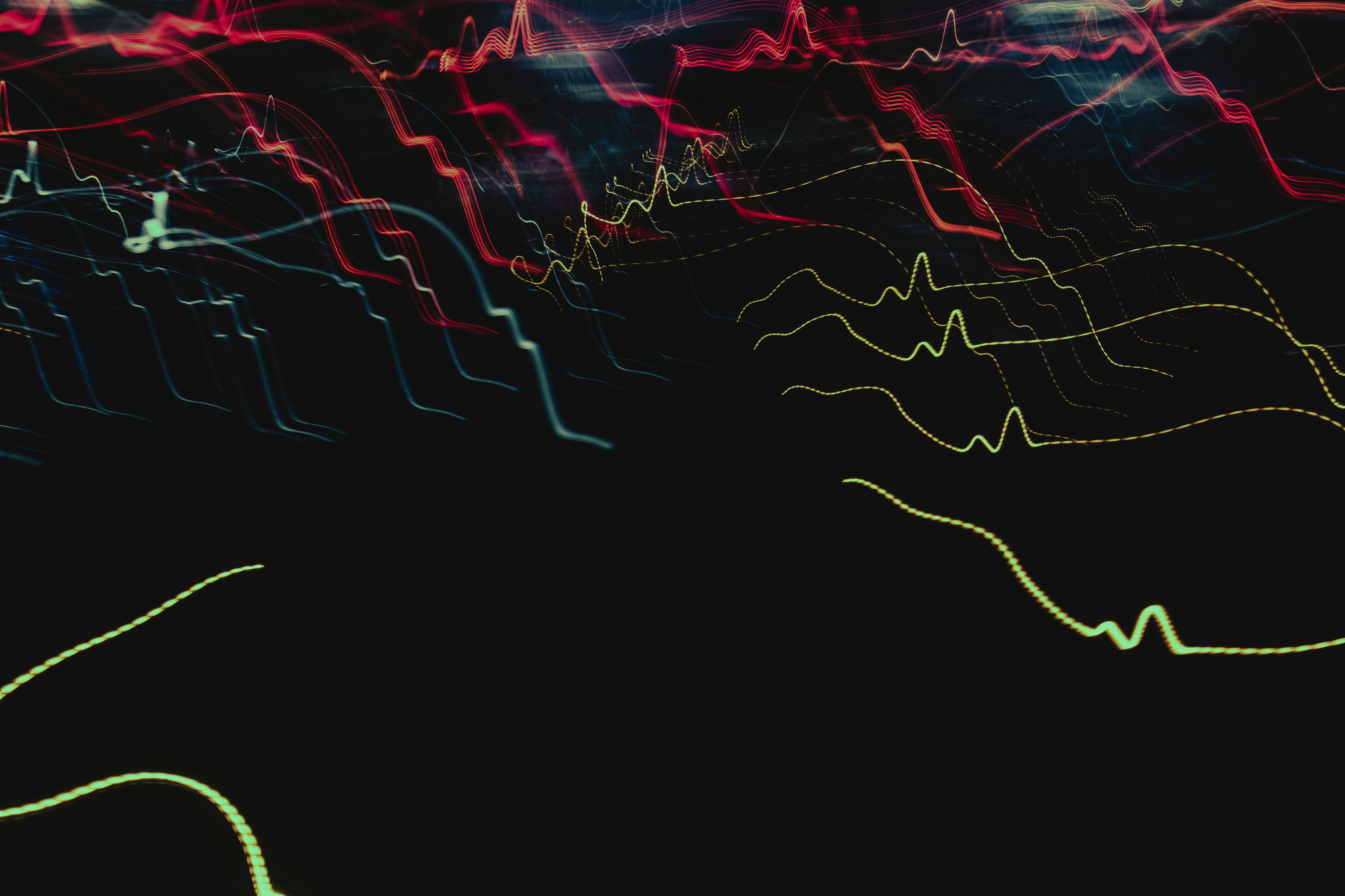 Neon Waves over Midnight: A Dance of Colorful Light Trails