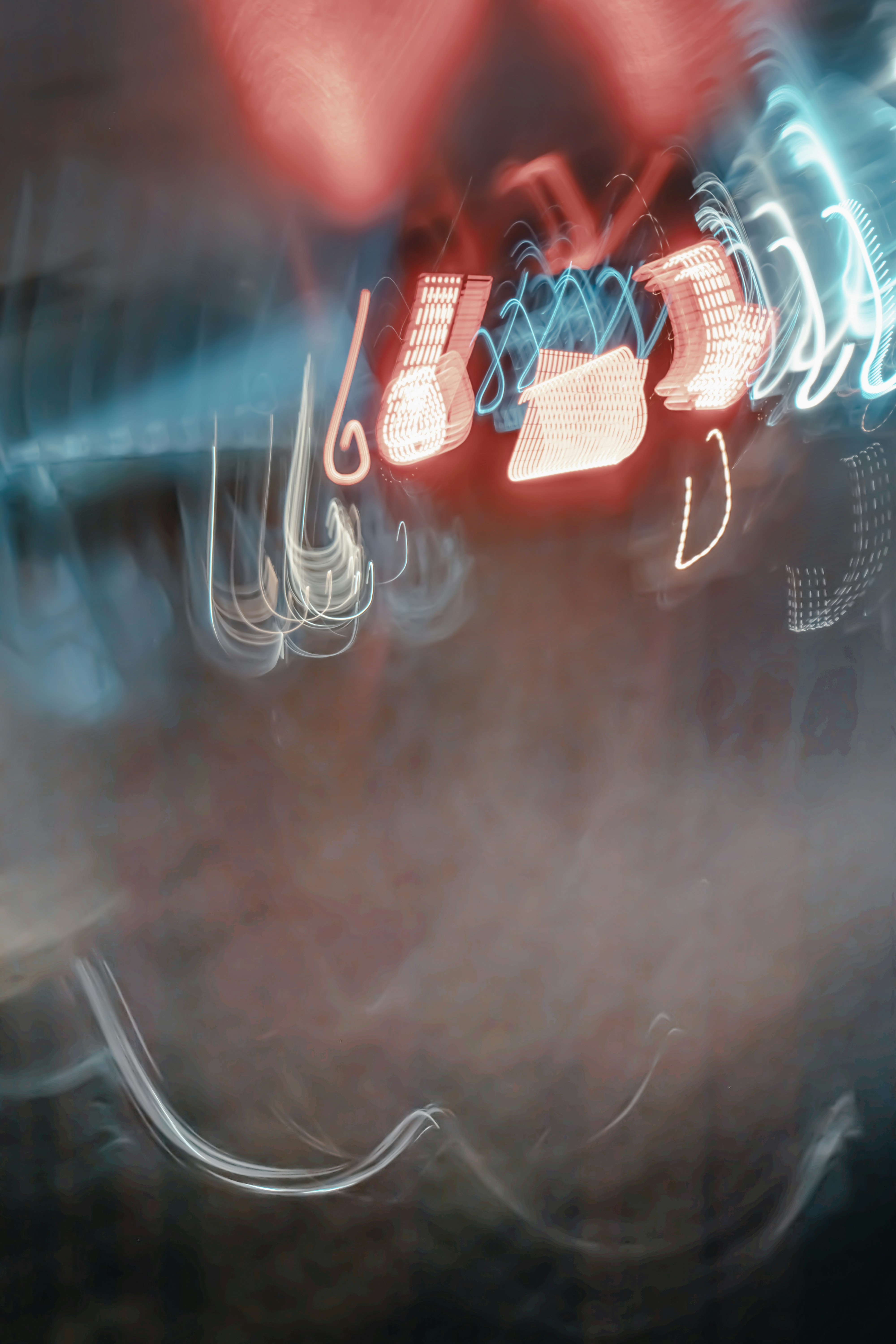 Neon Trails: Blur of Moving Lights in Night Urban Motion