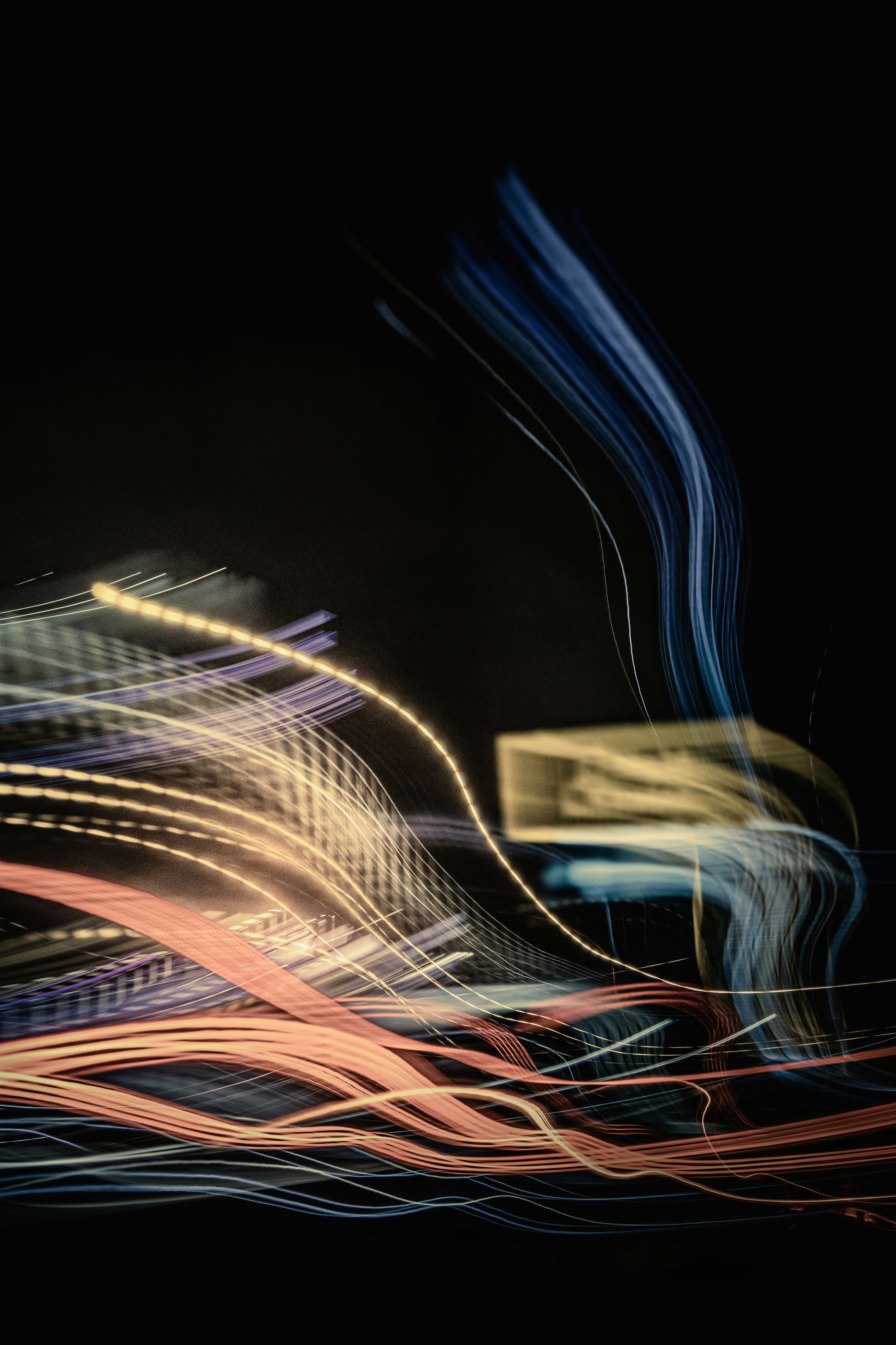 Night Traffic Trails: Neon Waves Across a Quiet City