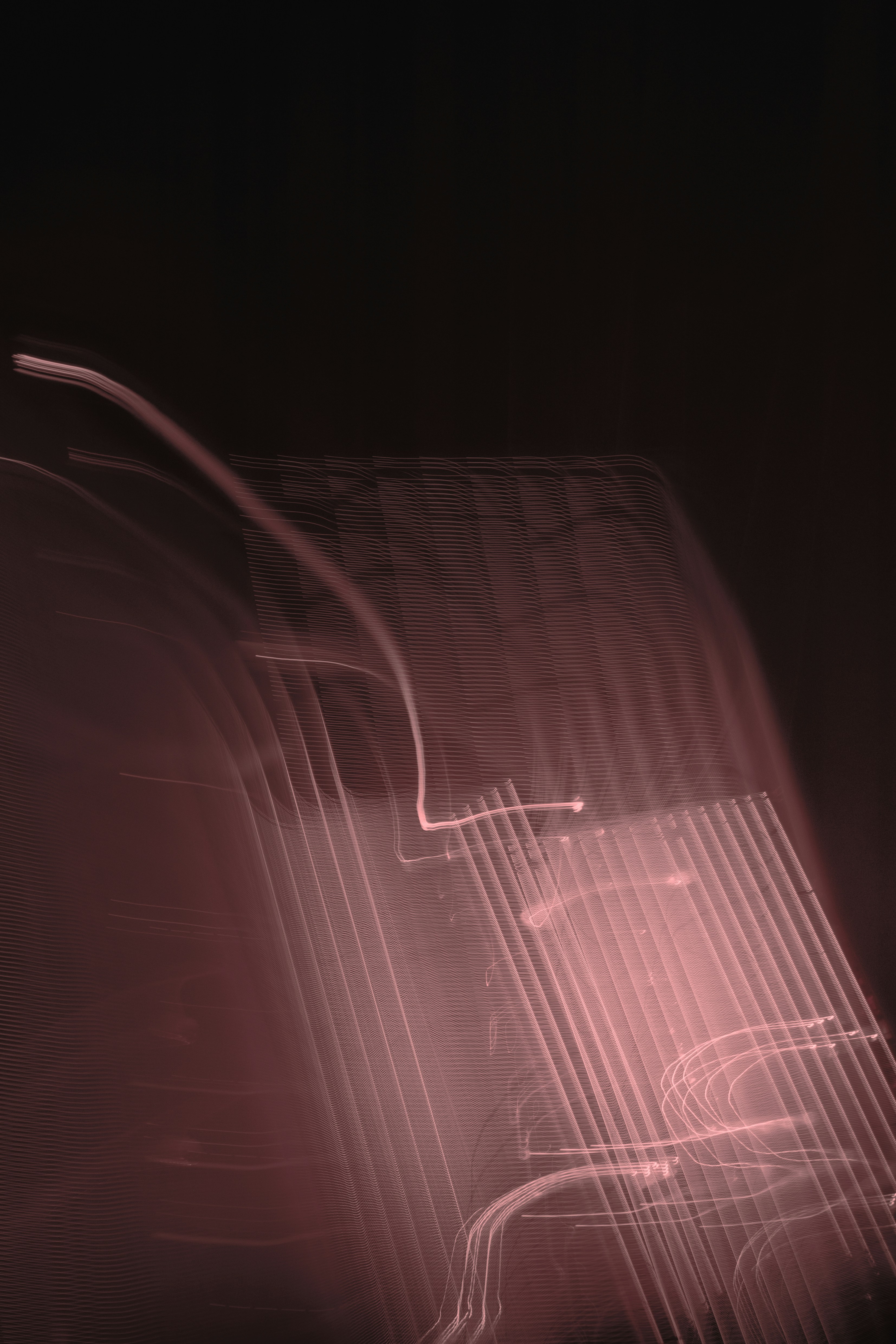 Curved Light Traces Through a Metallic Form
