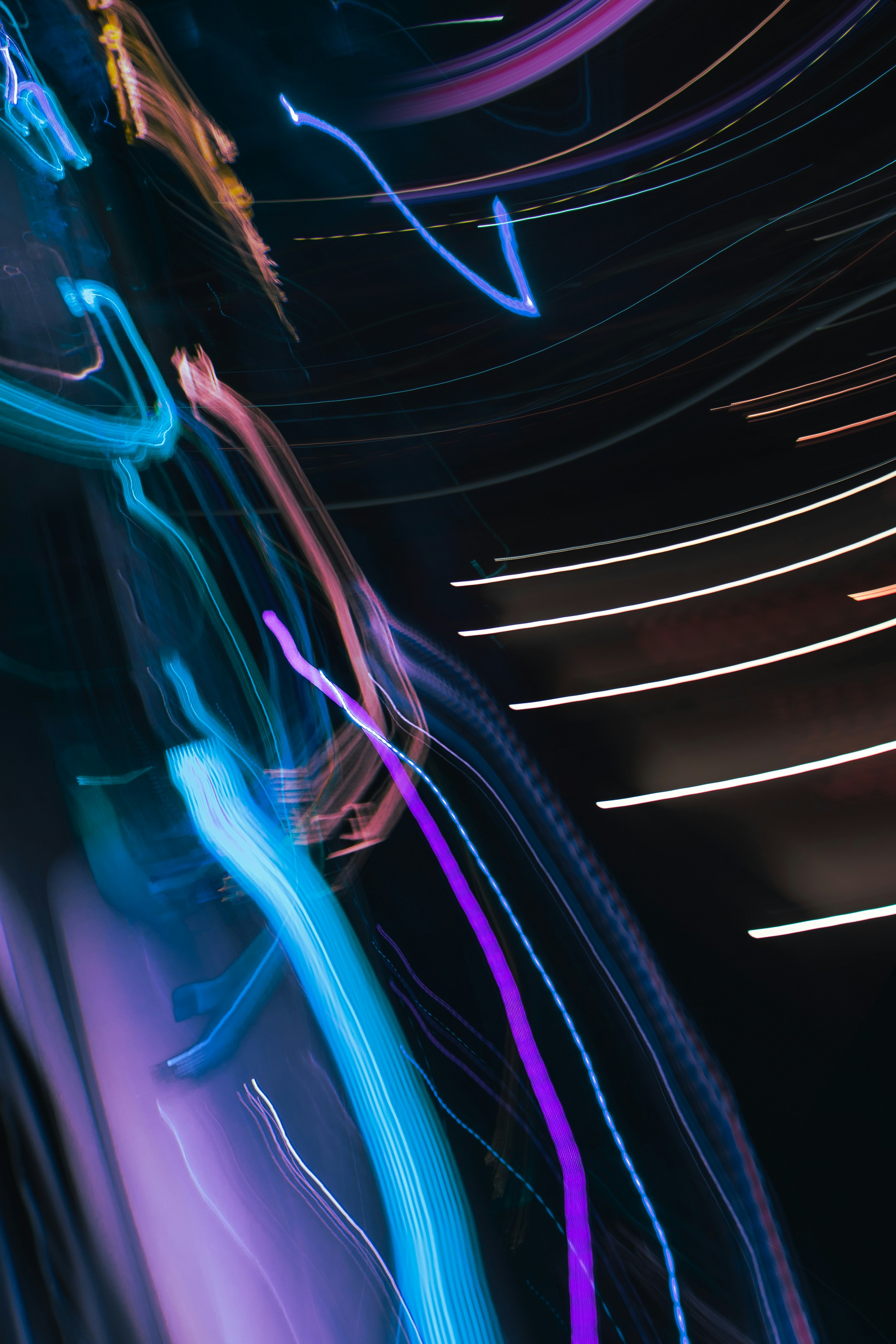 Neon Whirl: A Dance of Light Trails in Motion