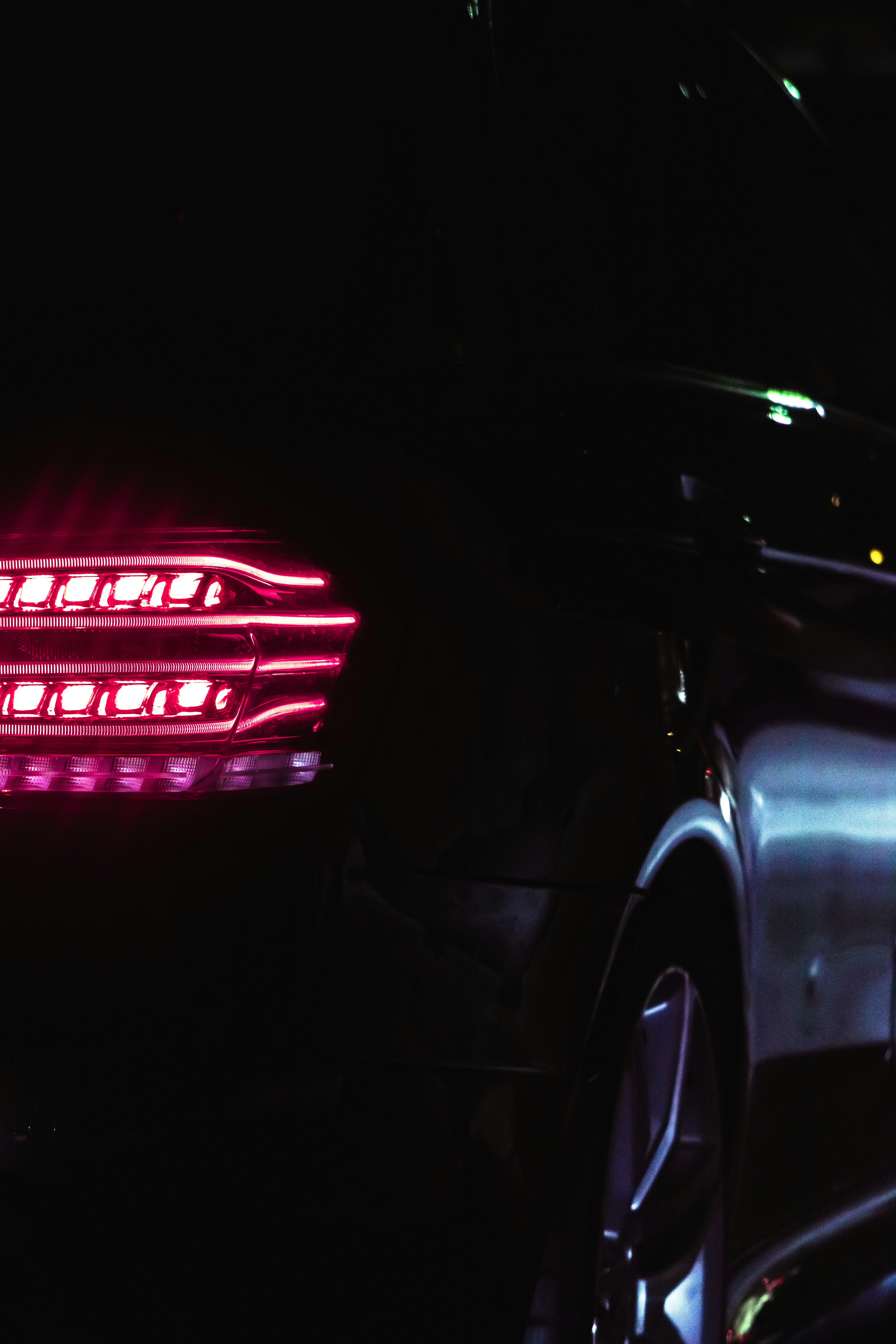Neon Glow on a Midnight Car silhouette