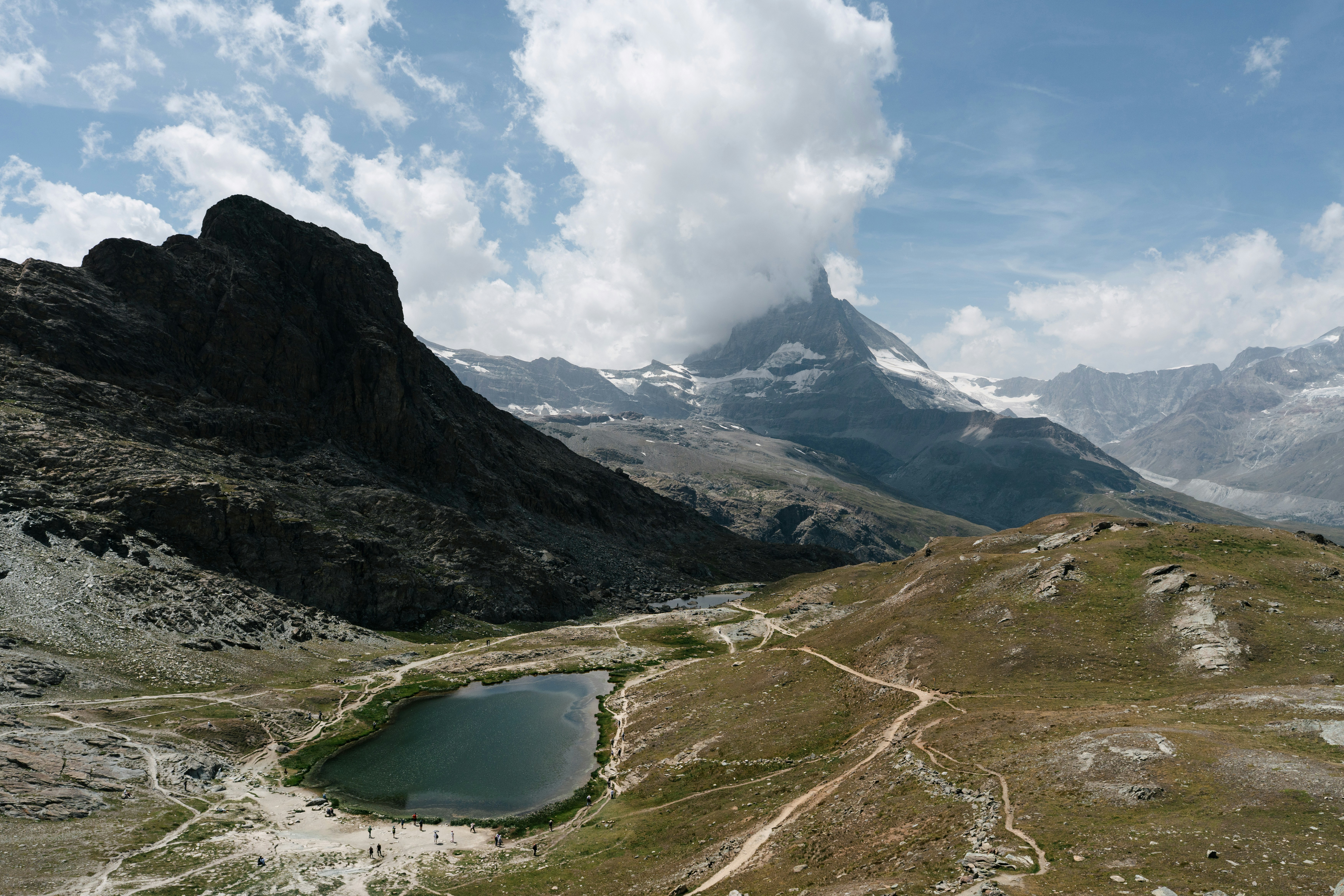 Majestic Alpine Confluence: A Lone Peak Over a Tundra Reservoir