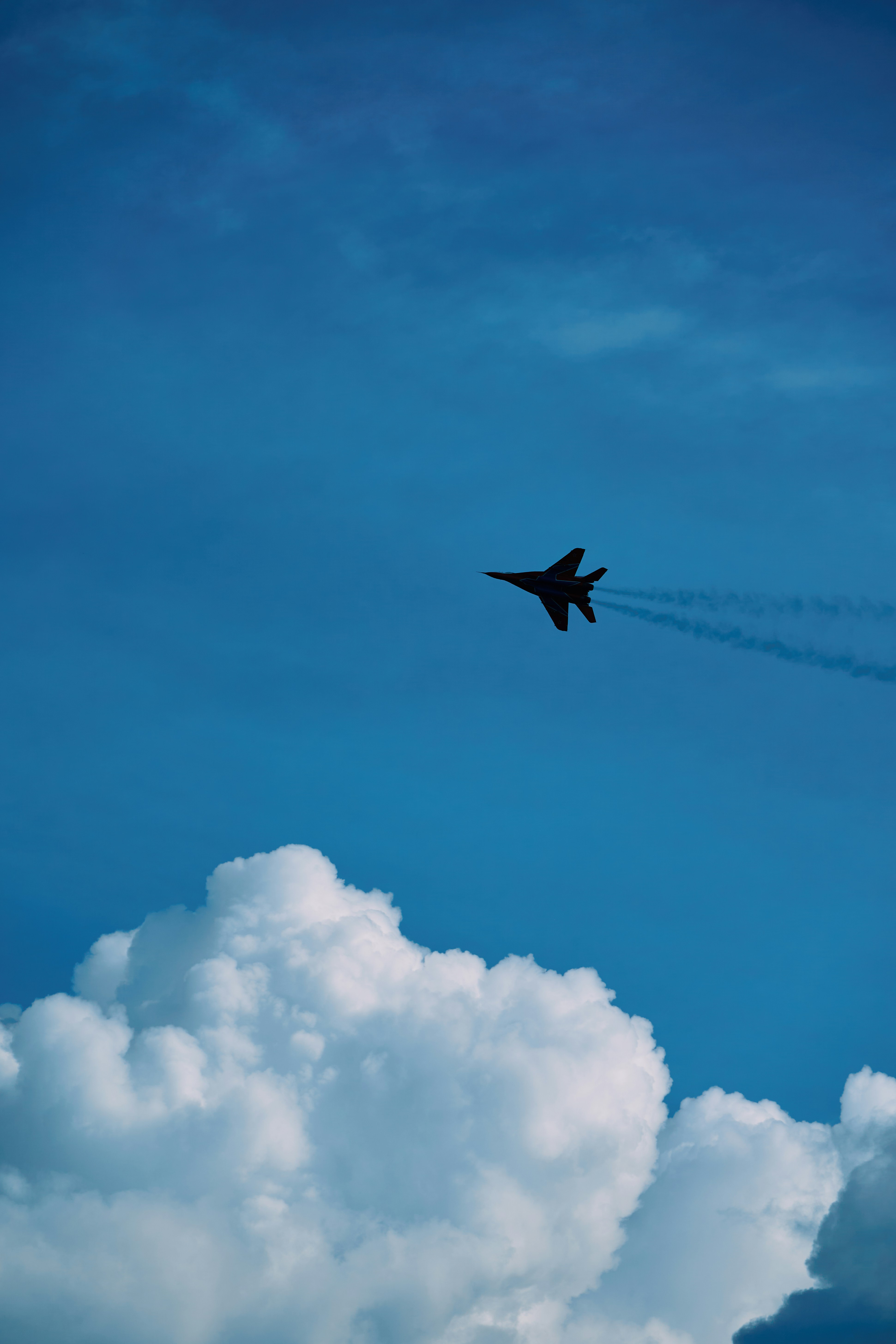 Icon in the Sky: A Jet Pierces the Cloudline