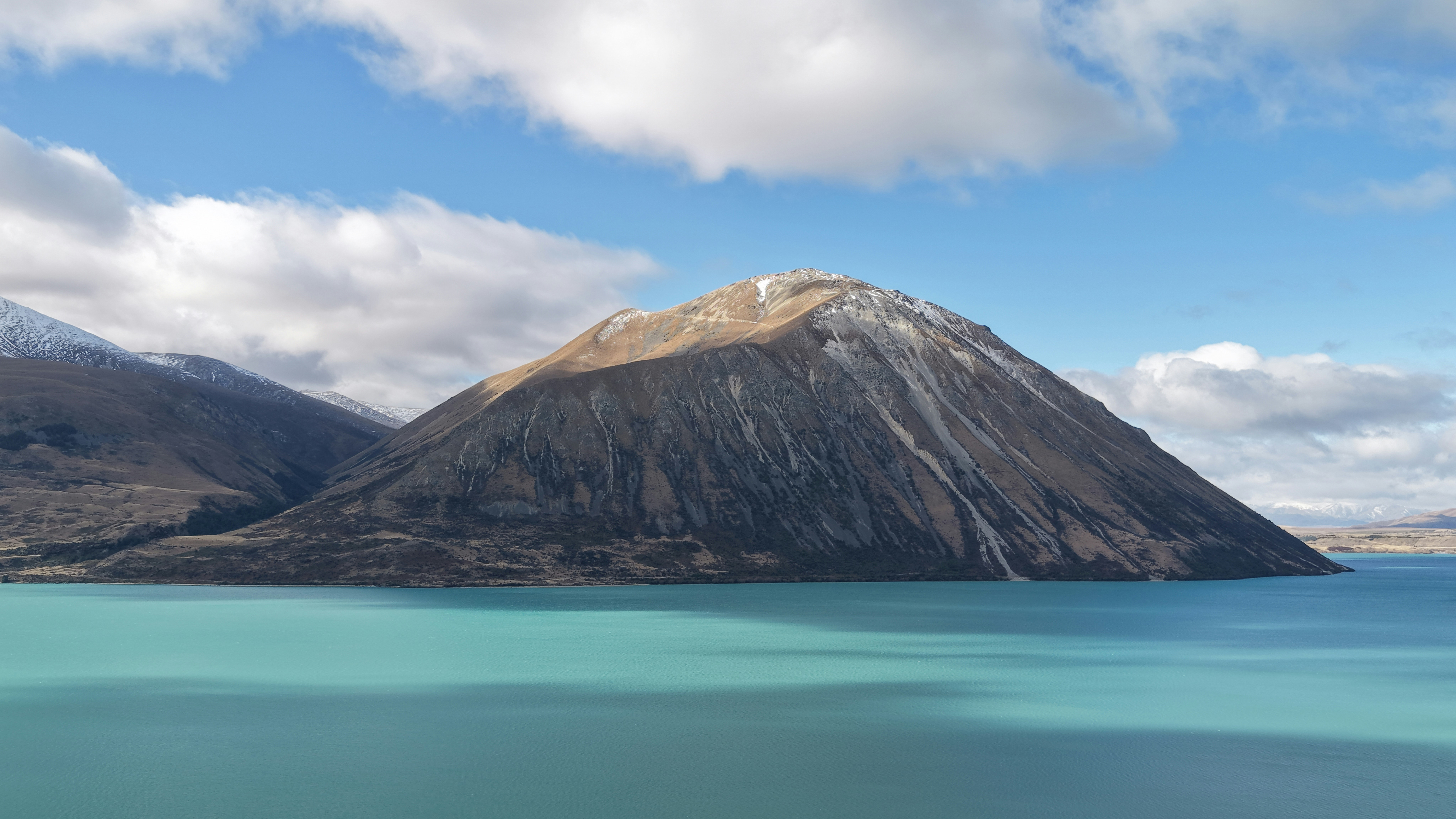 Emerald Bank: A Peak Rising from Turquoise Waters
