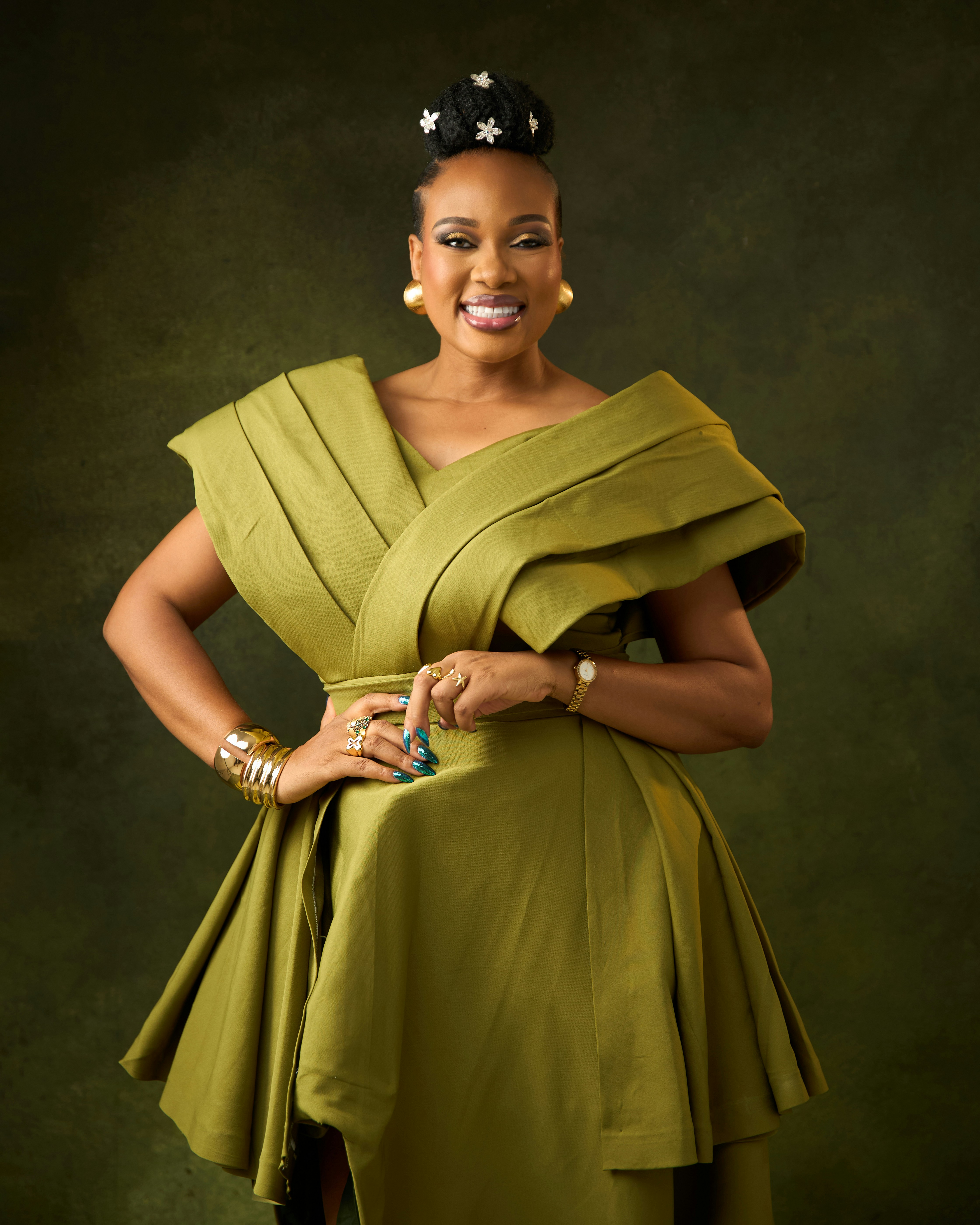Emerald Poise: Regal Green Gown & Confident Smile