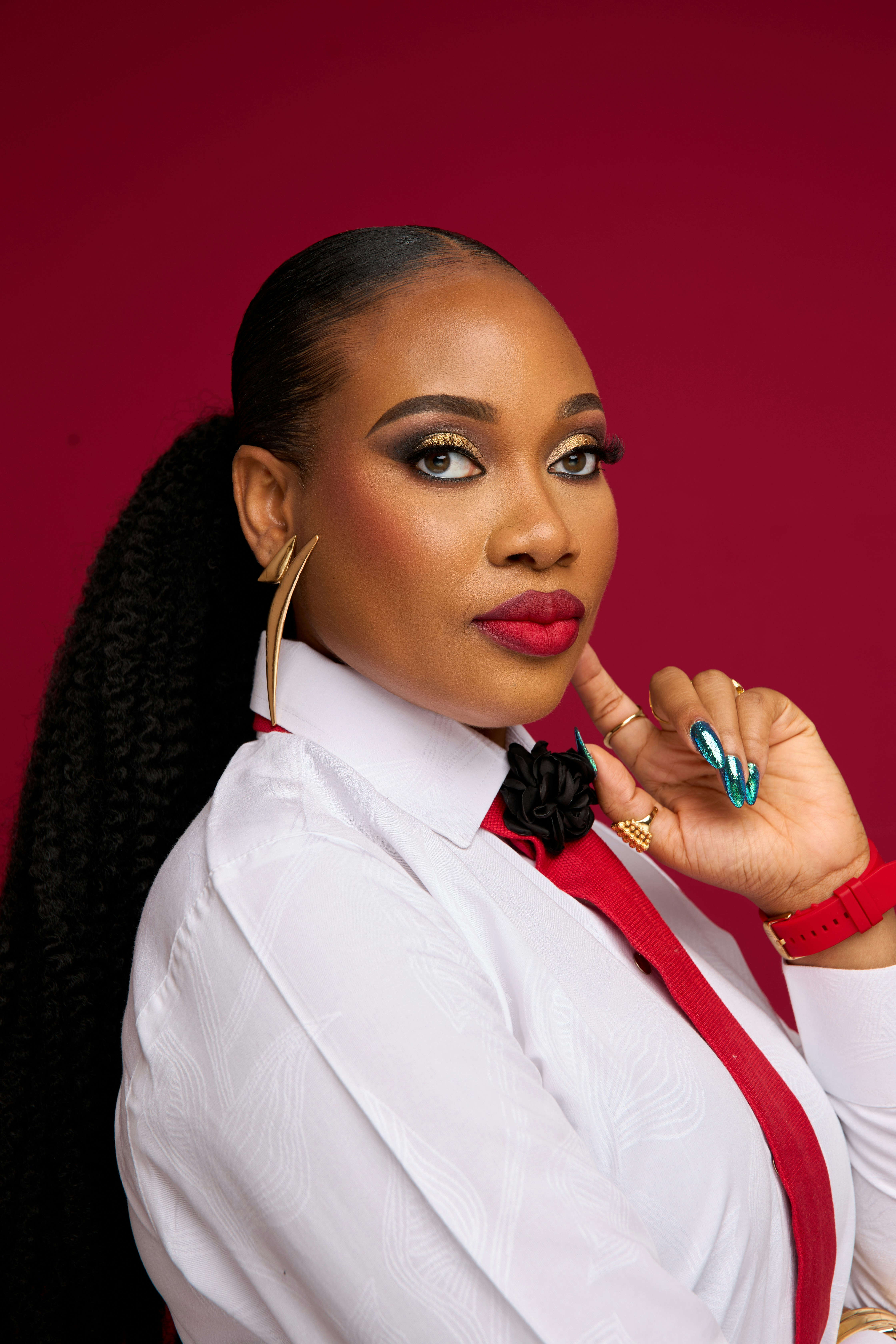 Portrait in Crimson: Bold Makeup and Royal Red Accents