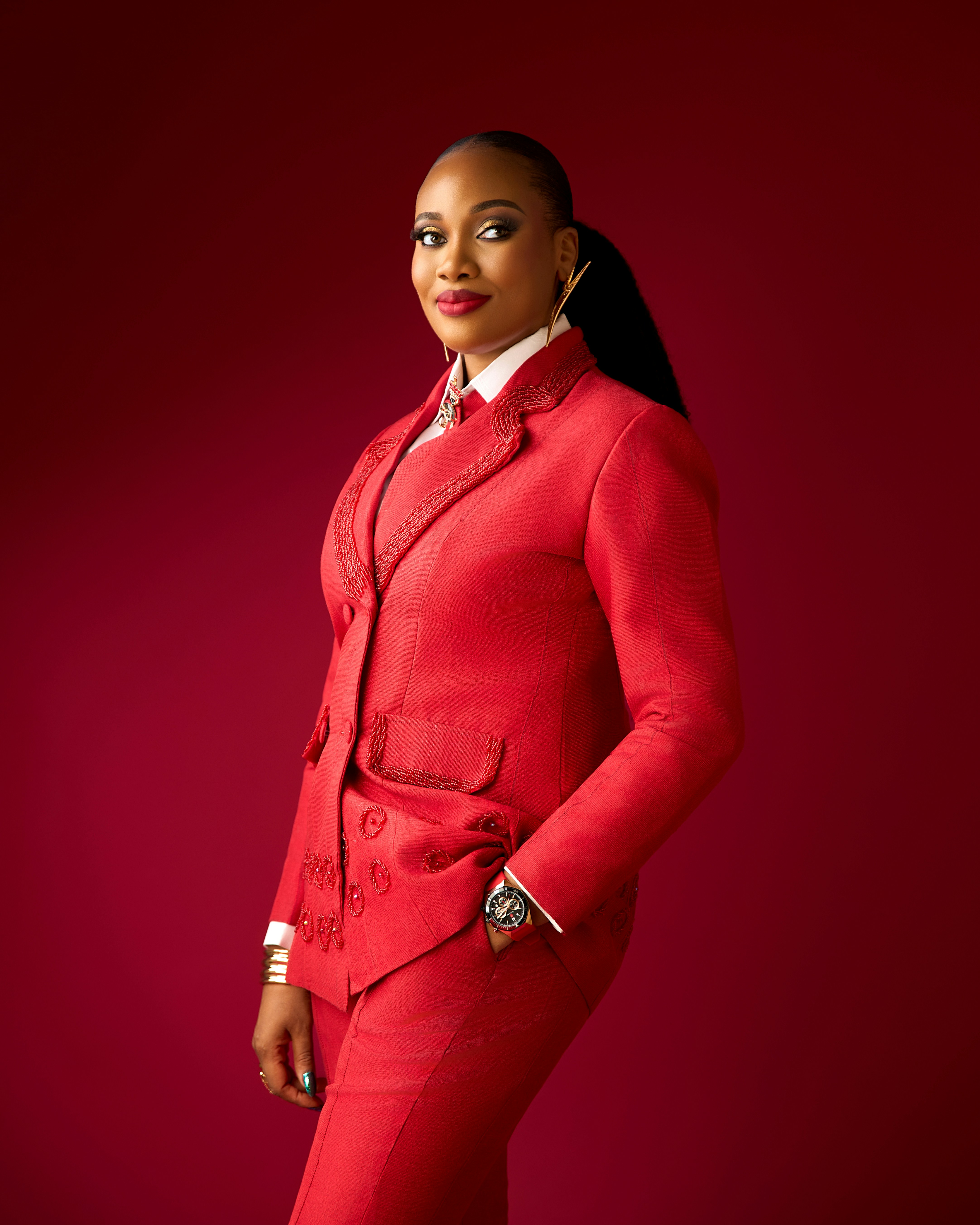 Red Suit, Bold Poise: A Portrait in Crimson Authority