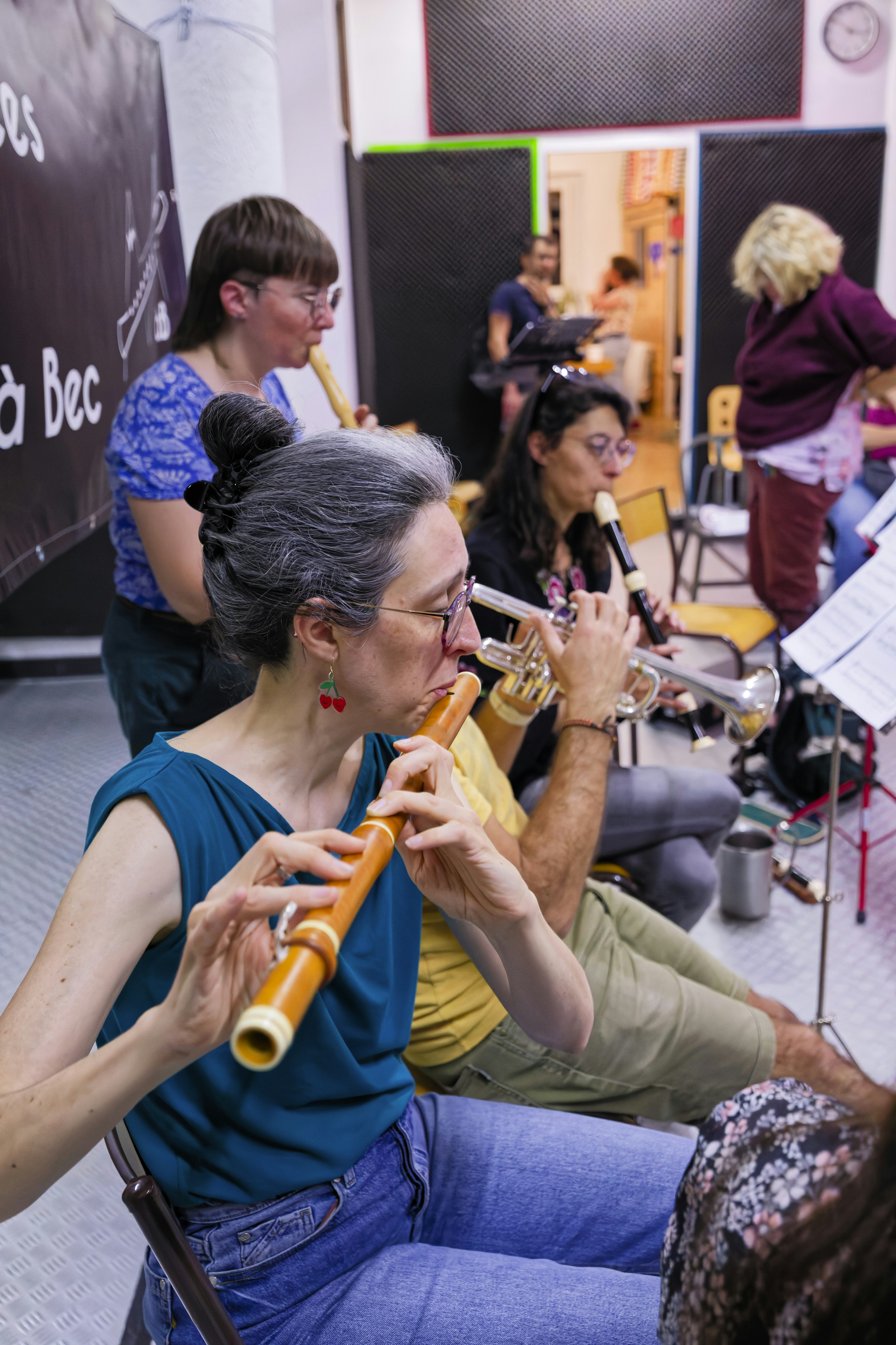 Melodic Focus: A Flute Ensemble in a Chalkboard-lit Rehearsal