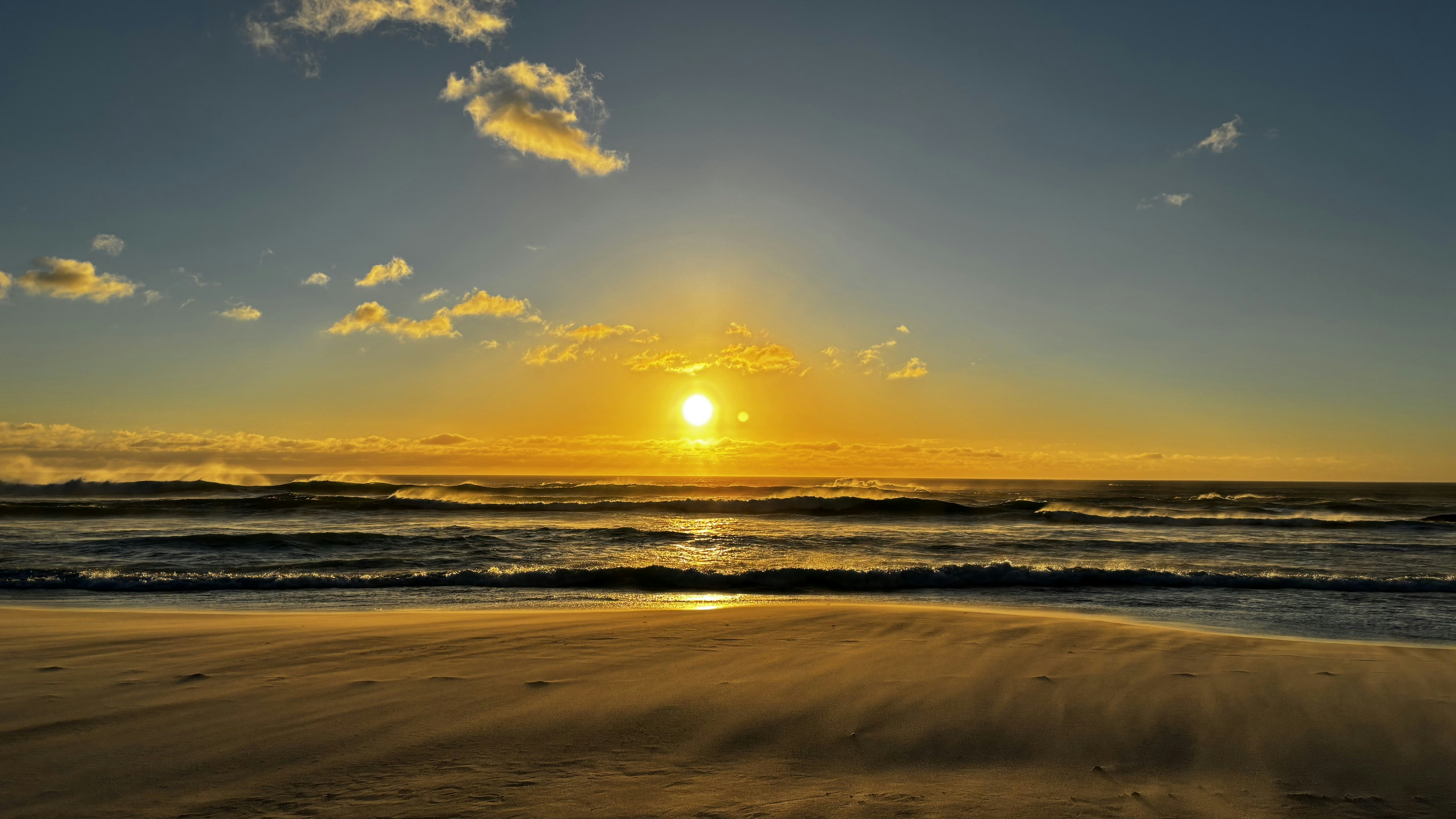 Sunlit Horizon: Quiet Tide at Dusk