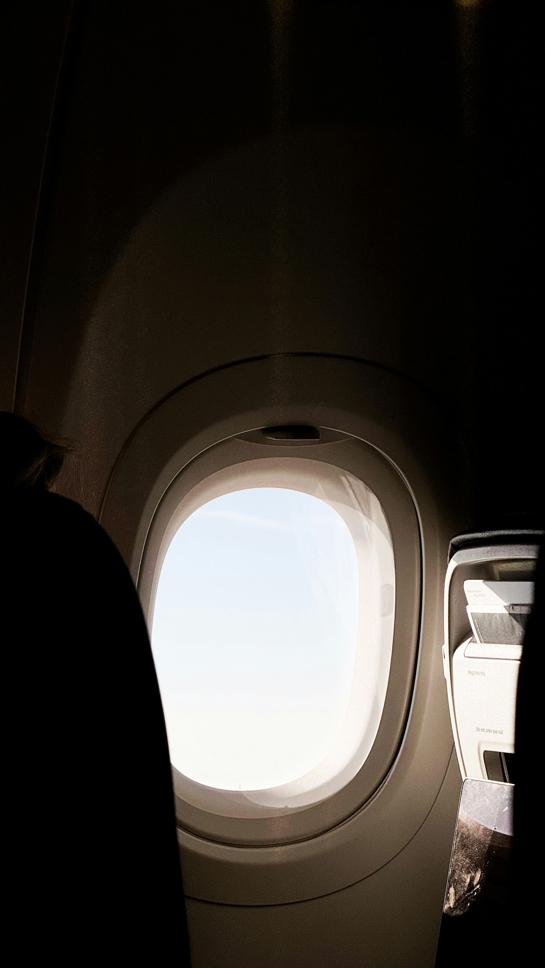 Window View: Quiet Sky Beyond a Cabin Wall